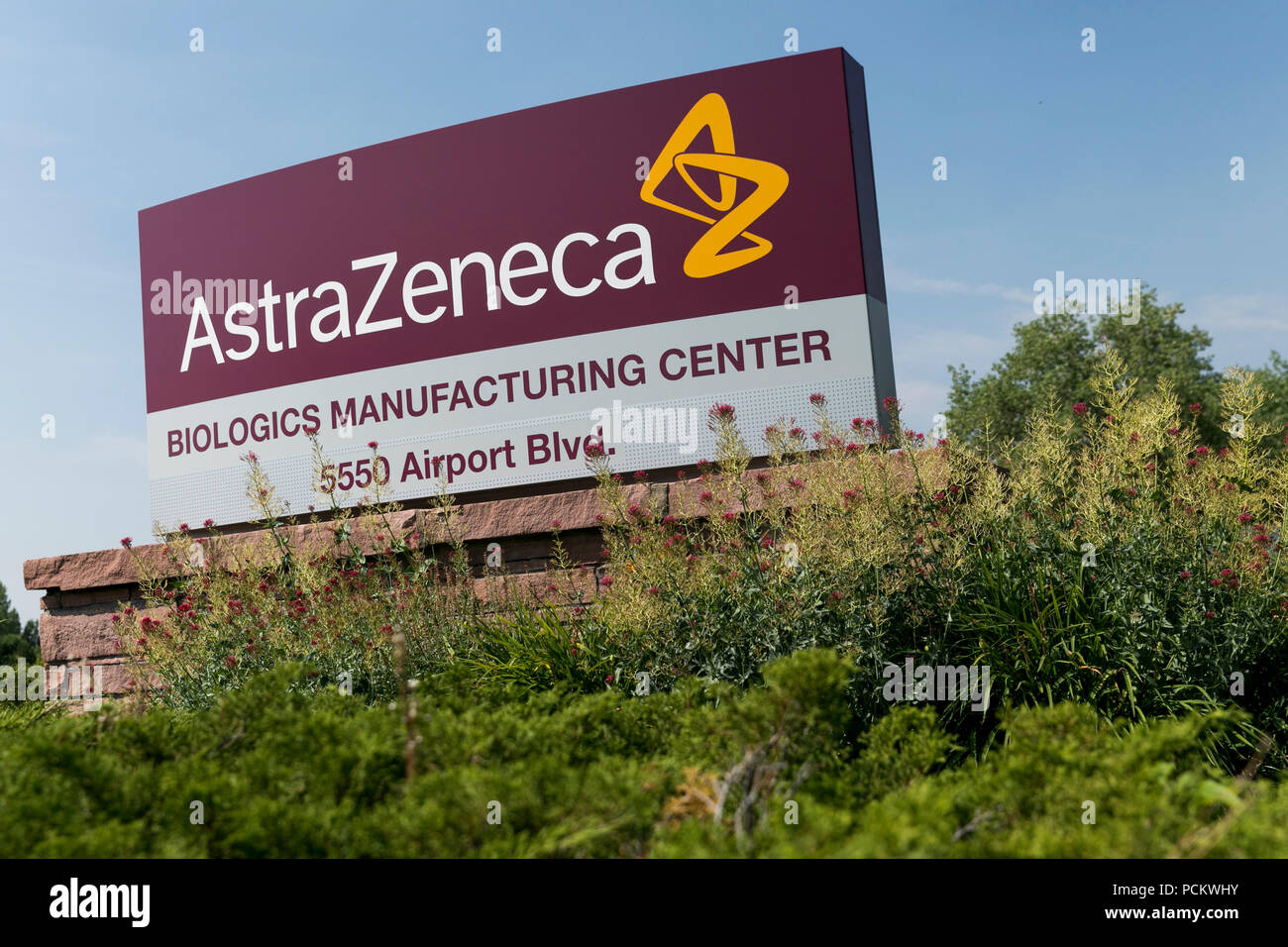 A logo sign outside of a facility occupied by AstraZeneca in Boulder ...