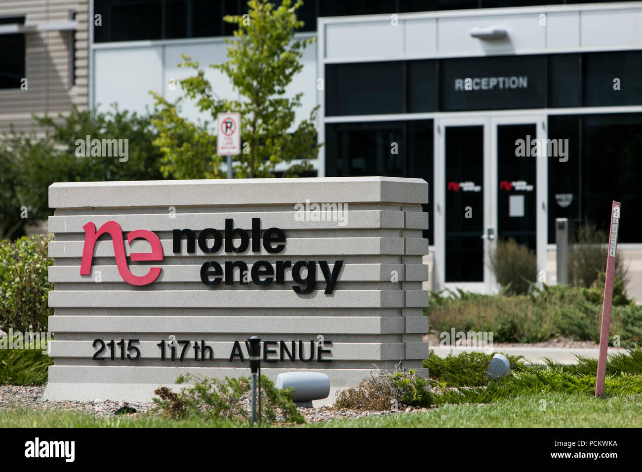 A logo sign outside of a facility occupied by Noble Energy, Inc., in ...