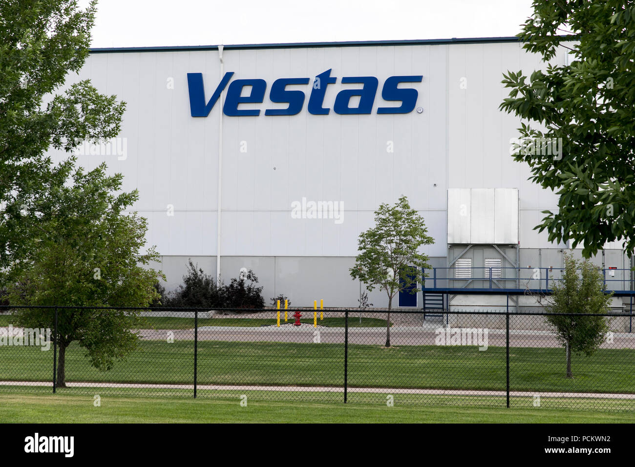 A logo sign outside of a facility occupied by Vestas Wind Systems in ...