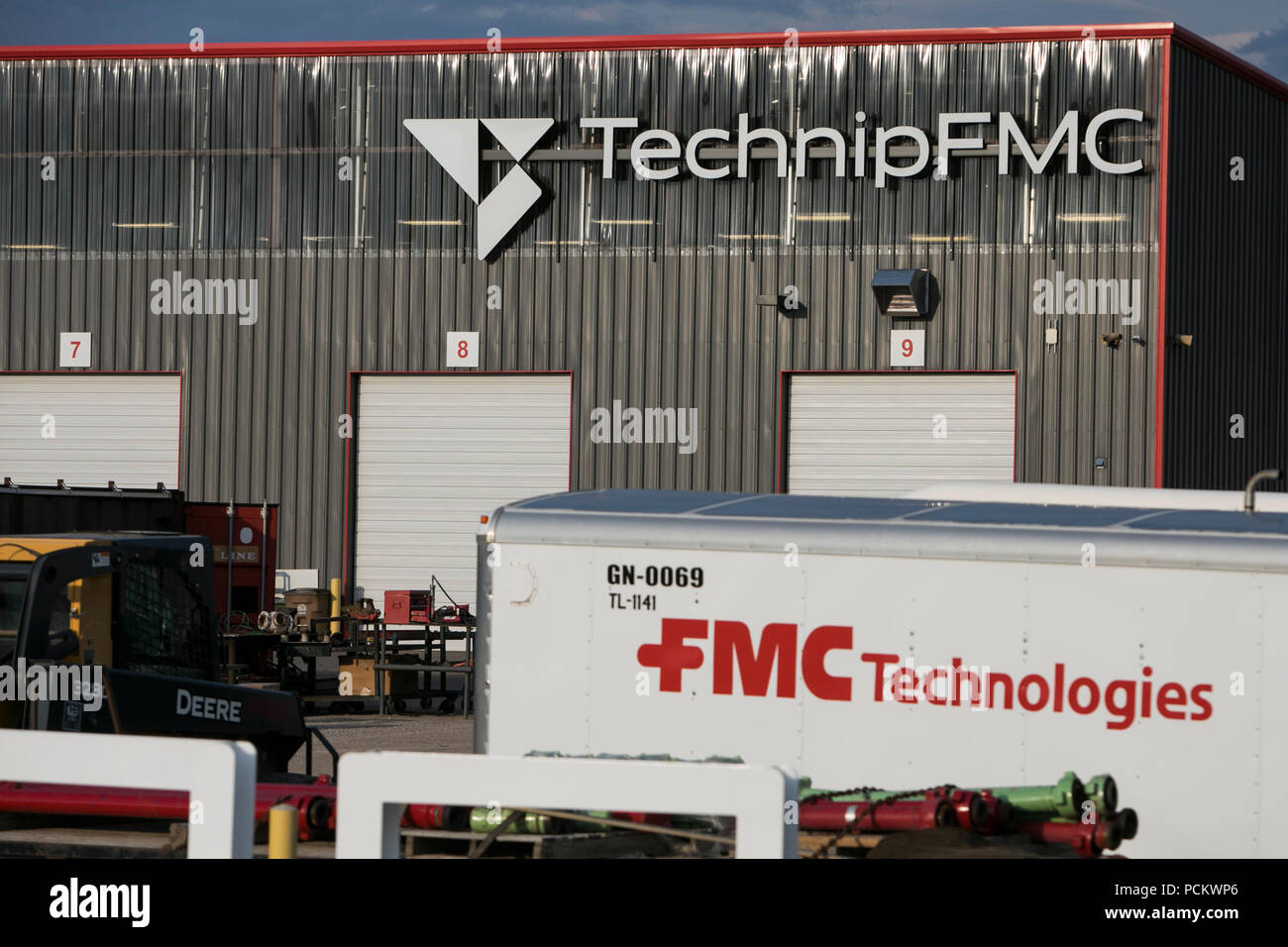 A logo sign outside of a facility occupied by TechnipFMC in Brighton ...