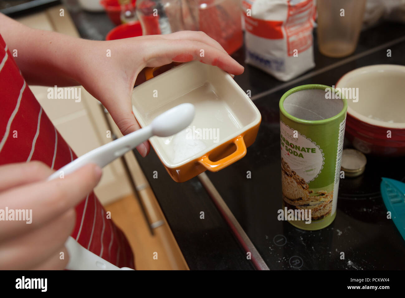 Messy baking ingredients on a kitchen counter Stock Photo - Alamy