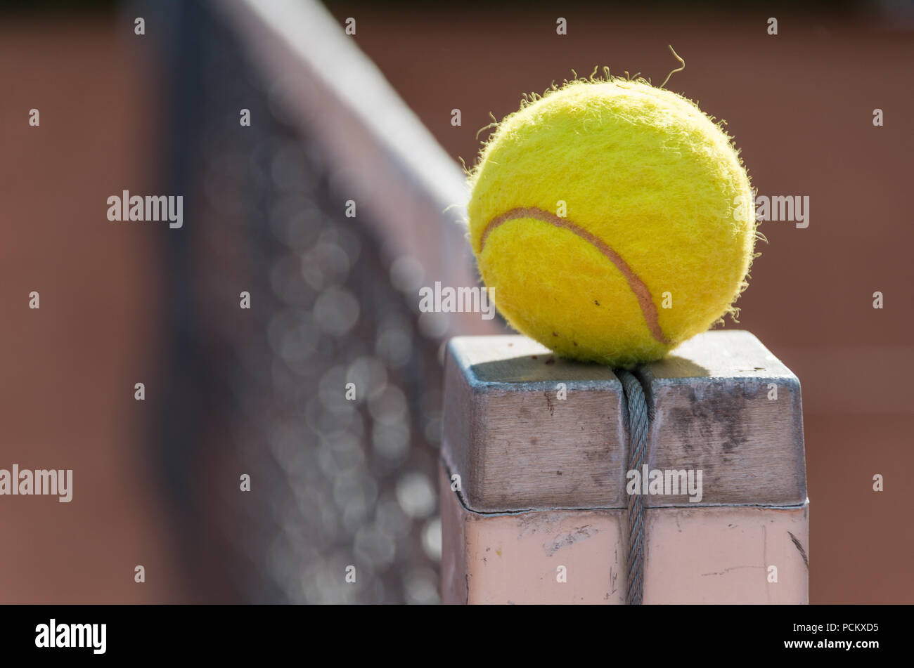 Close up of two tennis balls on court hi-res stock photography and ...