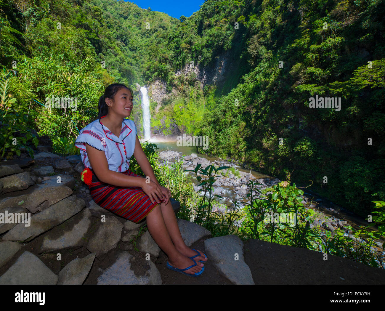 Girl from Ifugao Minority near a waterfall in Batad the Philippines ...