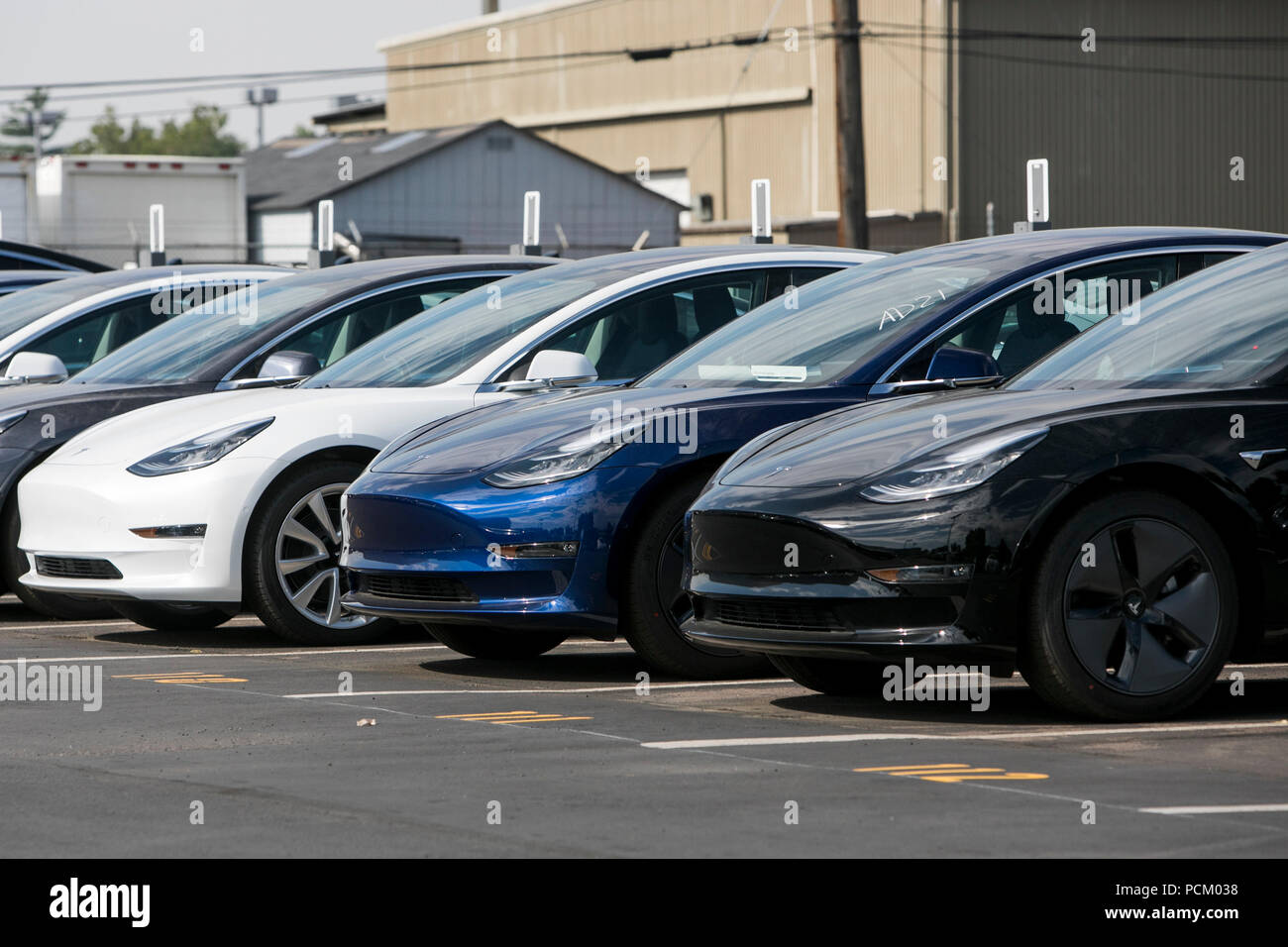 Tesla Model 3 electric vehicles at a Tesla Store location in Littleton ...