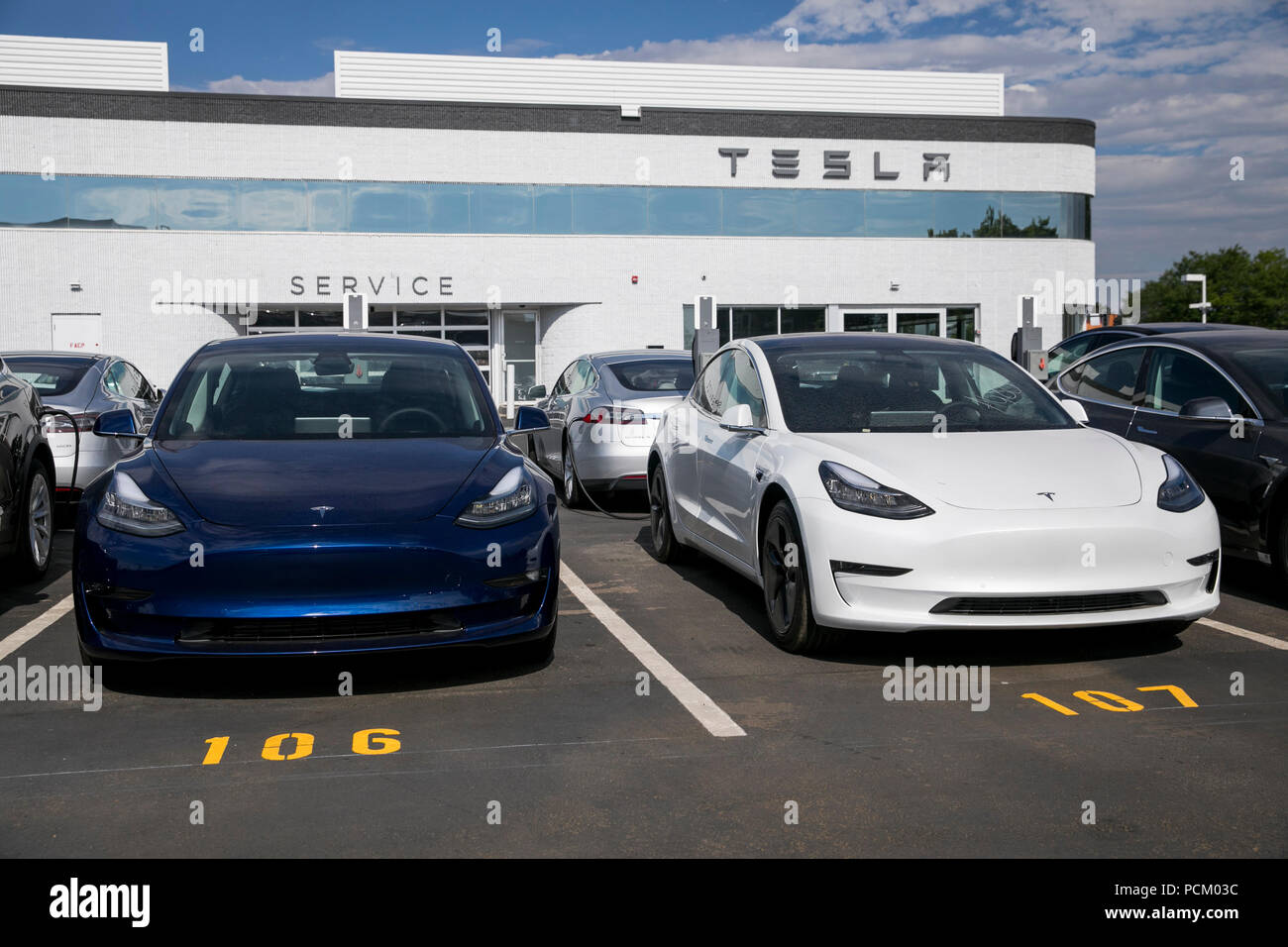 Tesla Model 3 electric vehicles at a Tesla Store location in Littleton ...
