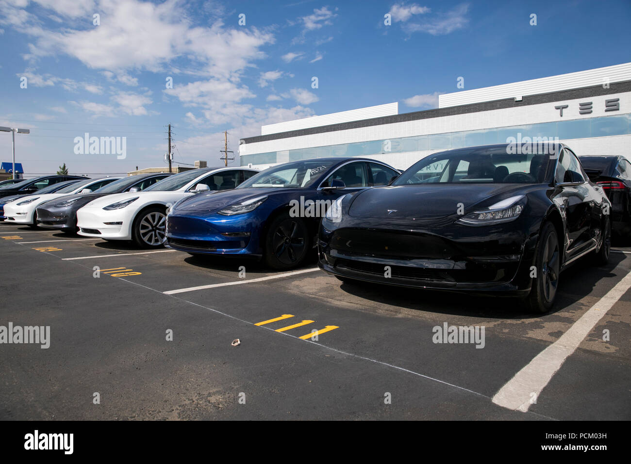 Tesla Model 3 electric vehicles at a Tesla Store location in Littleton ...