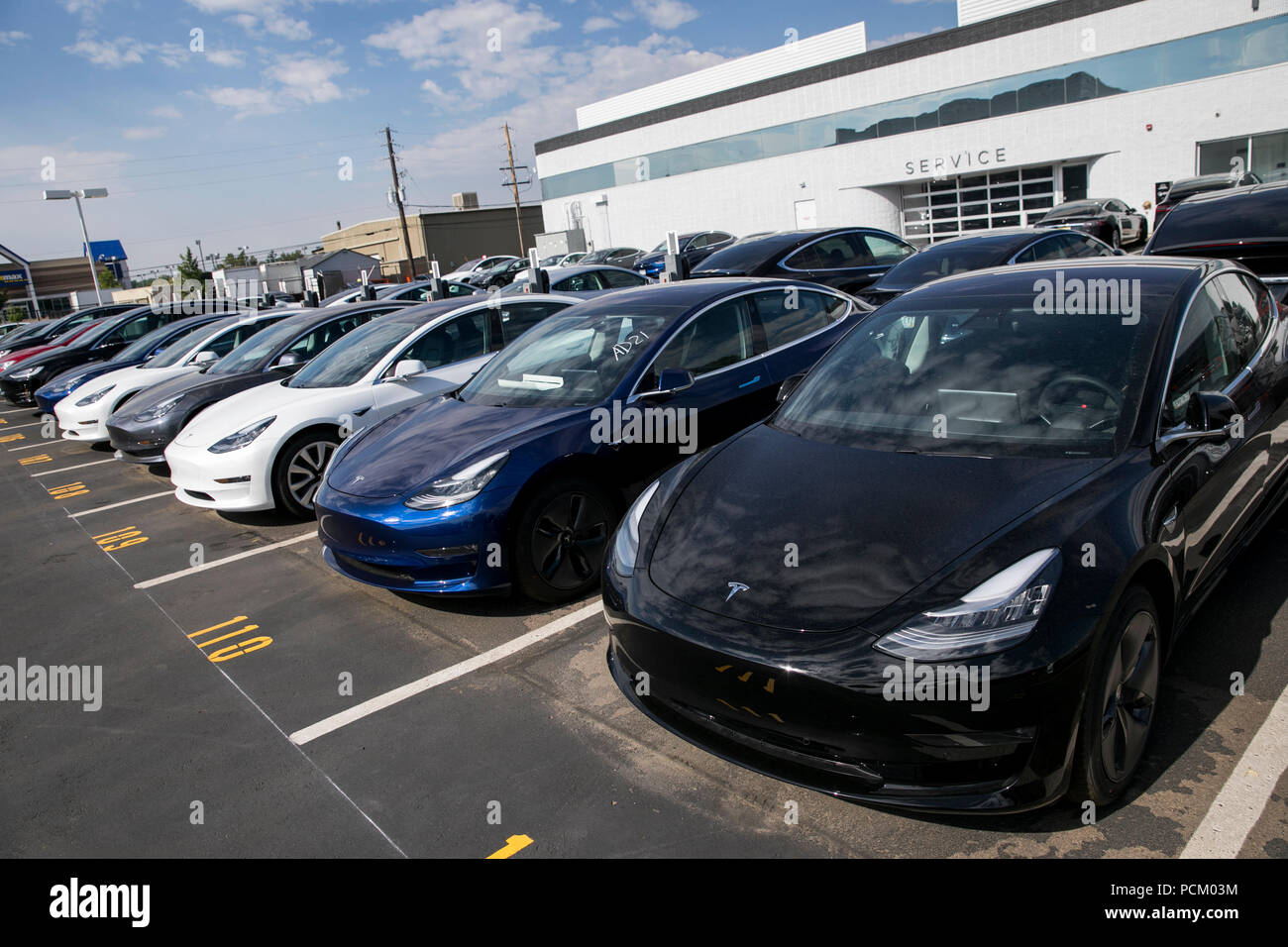 Tesla Model 3 electric vehicles at a Tesla Store location in Littleton ...