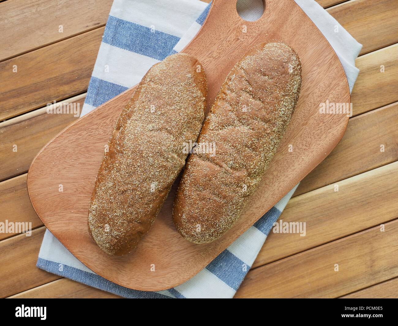 Whole-wheat bread baked in the oven Stock Photo - Alamy