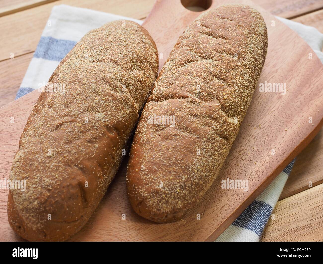 Whole-wheat bread baked in the oven Stock Photo - Alamy