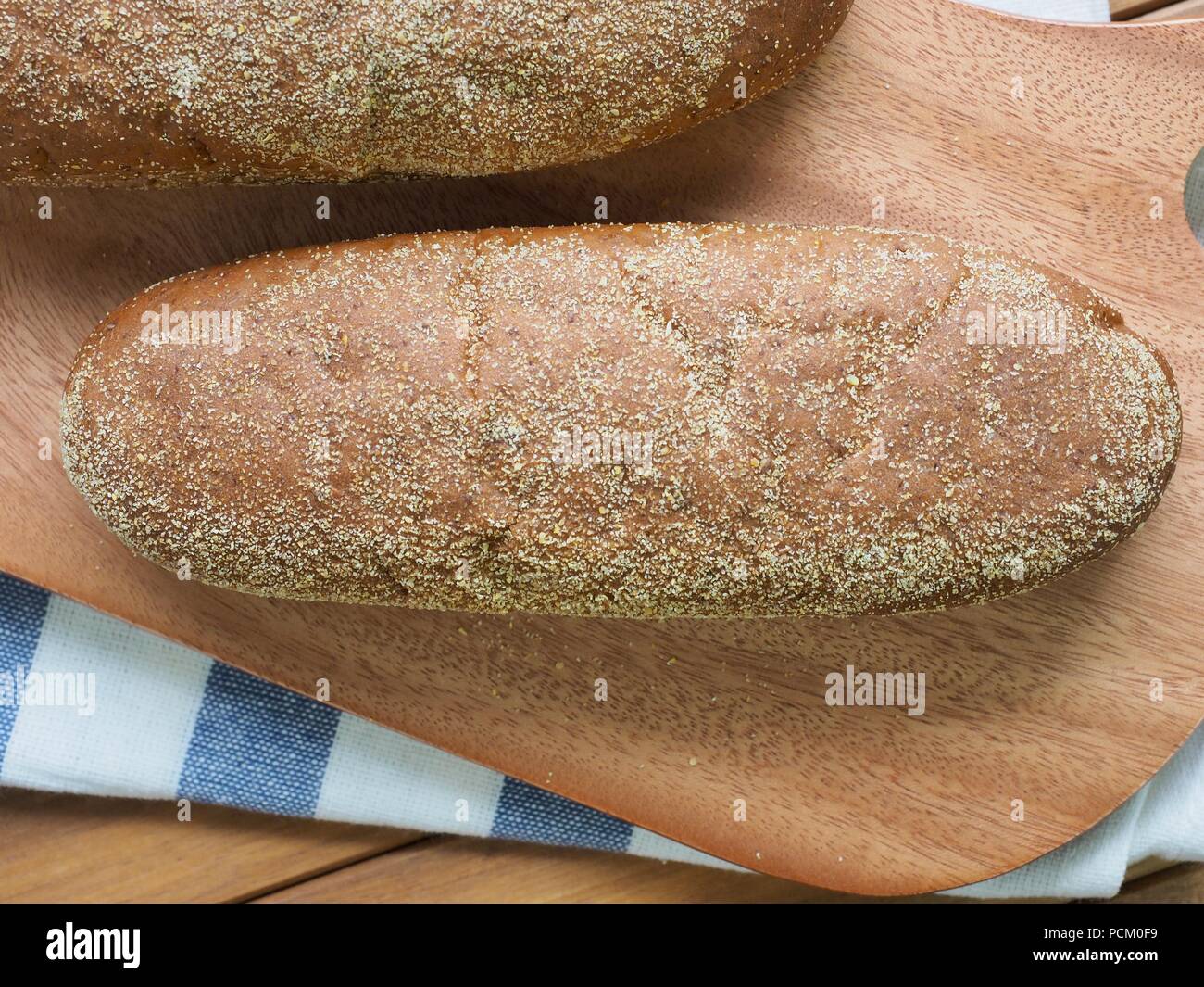 Whole-wheat bread baked in the oven Stock Photo - Alamy