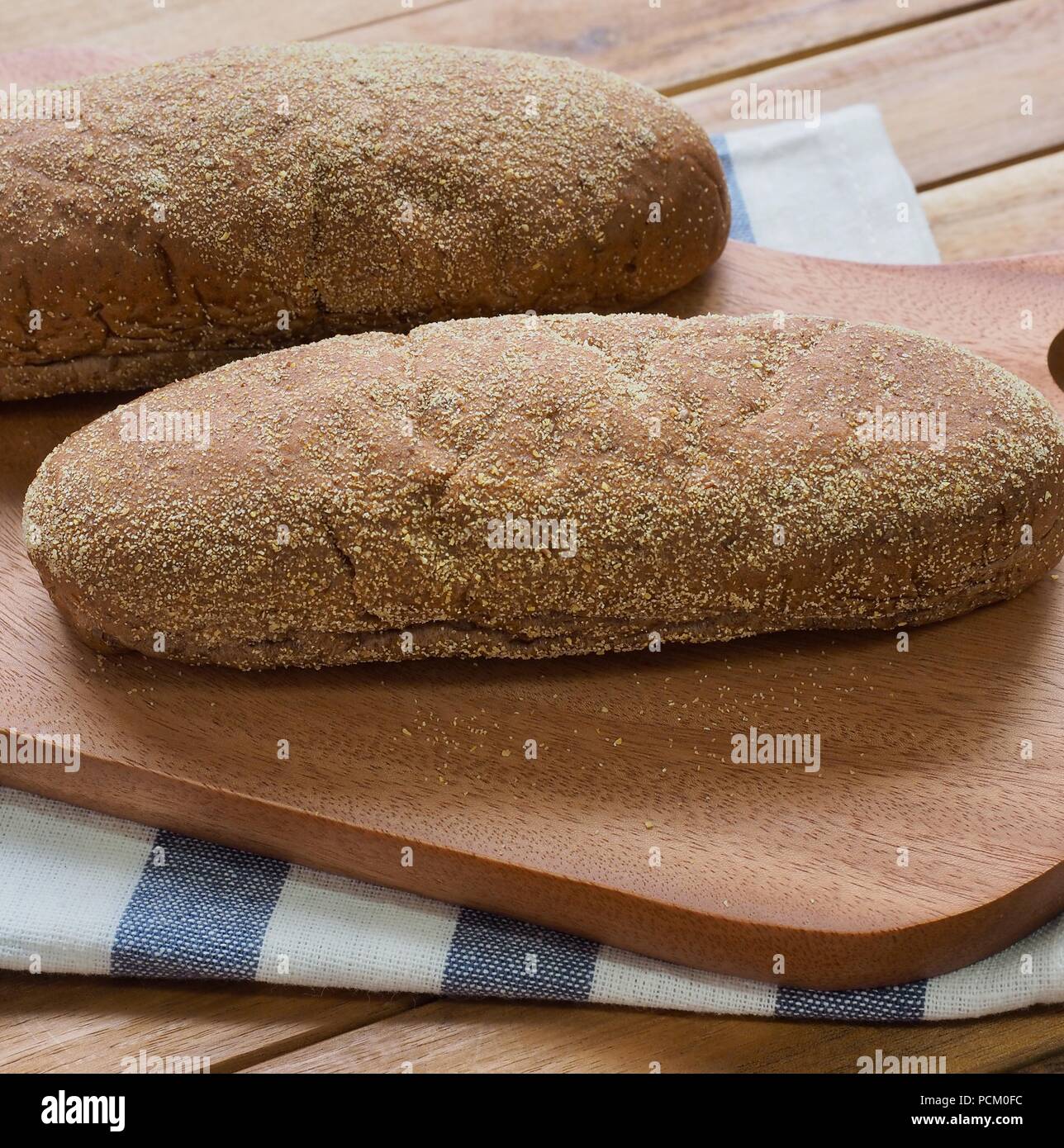 Whole-wheat bread baked in the oven Stock Photo - Alamy
