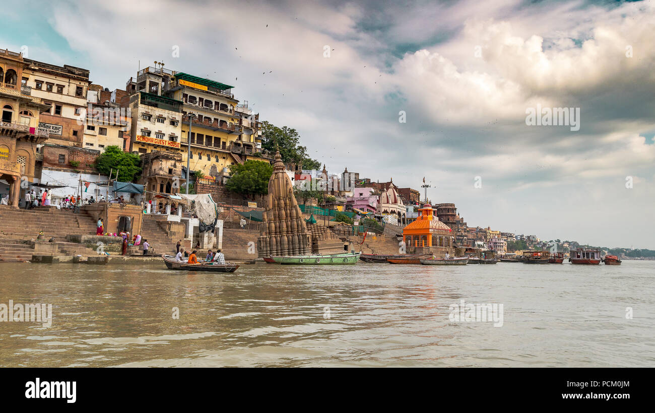 A view from River Ganges of Old Historical Varanasi city with weathered ...