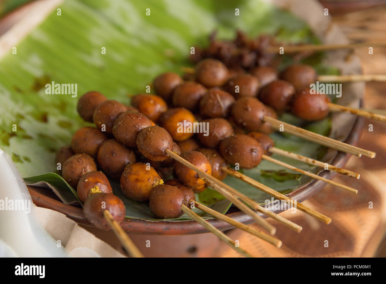sate telur puyuh. indonesian bird's egg satay Stock Photo - Alamy