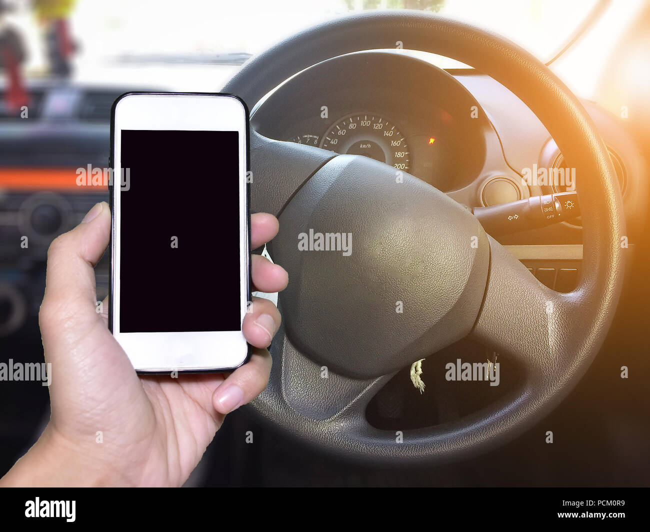 Smart phone in Car on road,Car on street,Car parked on street Stock ...