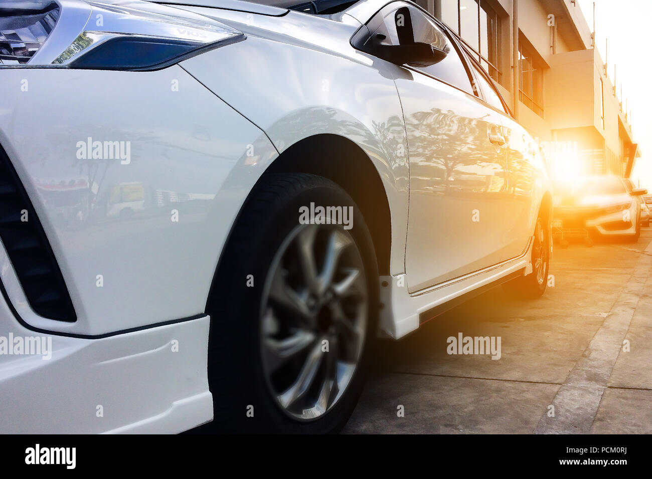Car parked on street,Car parked on road Stock Photo - Alamy