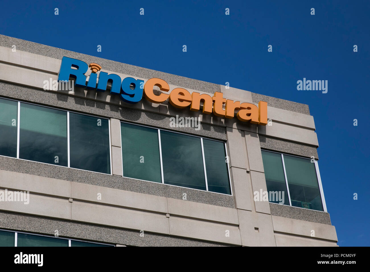 A logo sign outside of a facility occupied by RingCentral in Centennial ...
