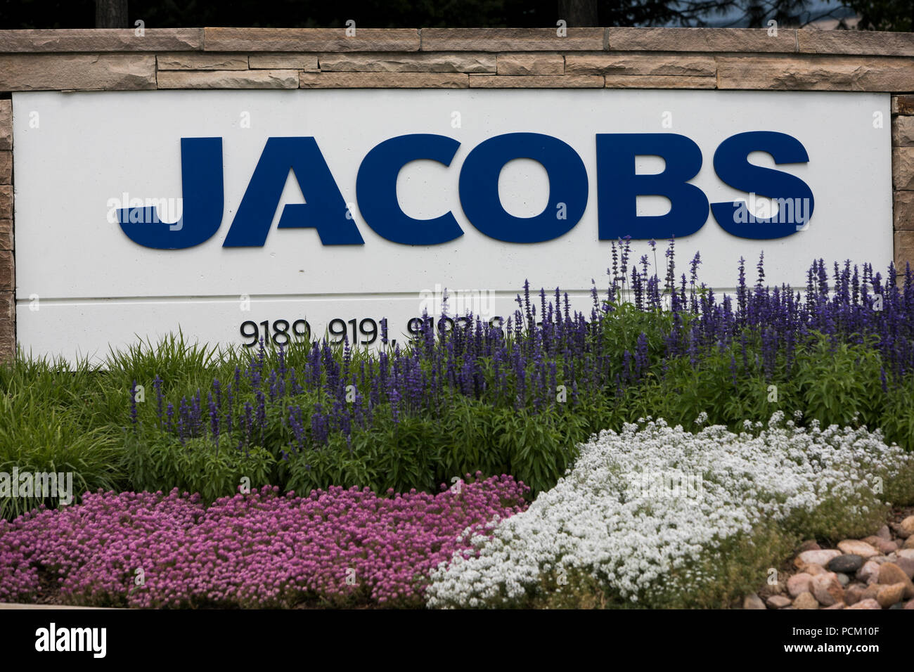 A logo sign outside of a facility occupied by the Jacobs Engineering ...