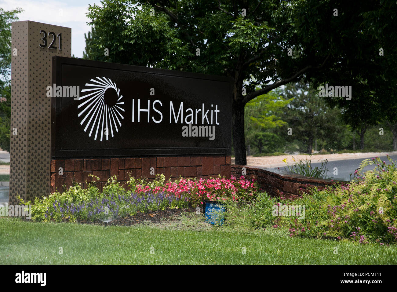 A logo sign outside of a facility occupied by IHS Markit in Englewood ...