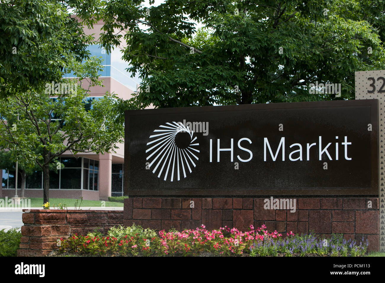 A logo sign outside of a facility occupied by IHS Markit in Englewood ...