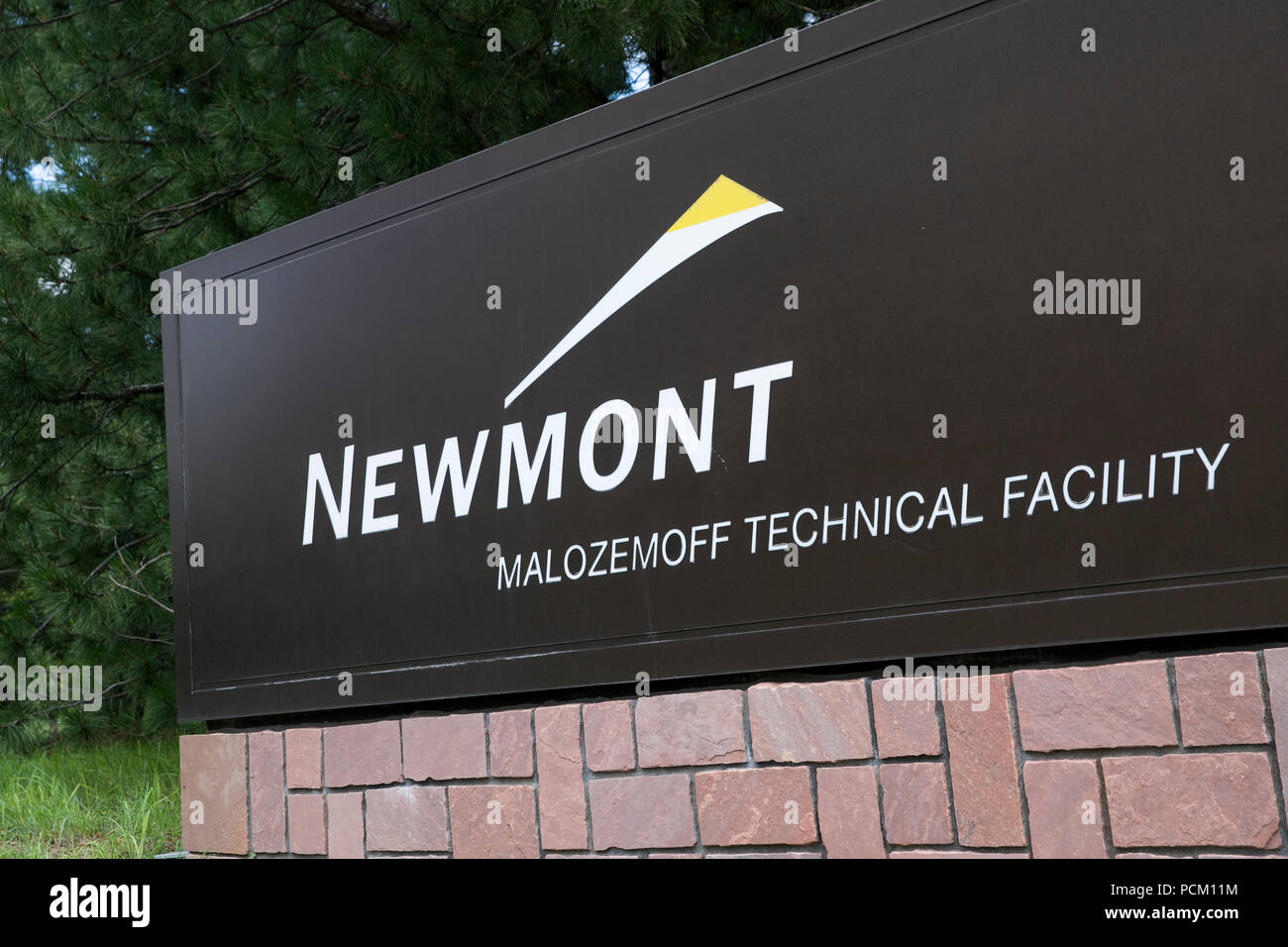 A logo sign outside of a facility occupied by the Newmont Mining ...