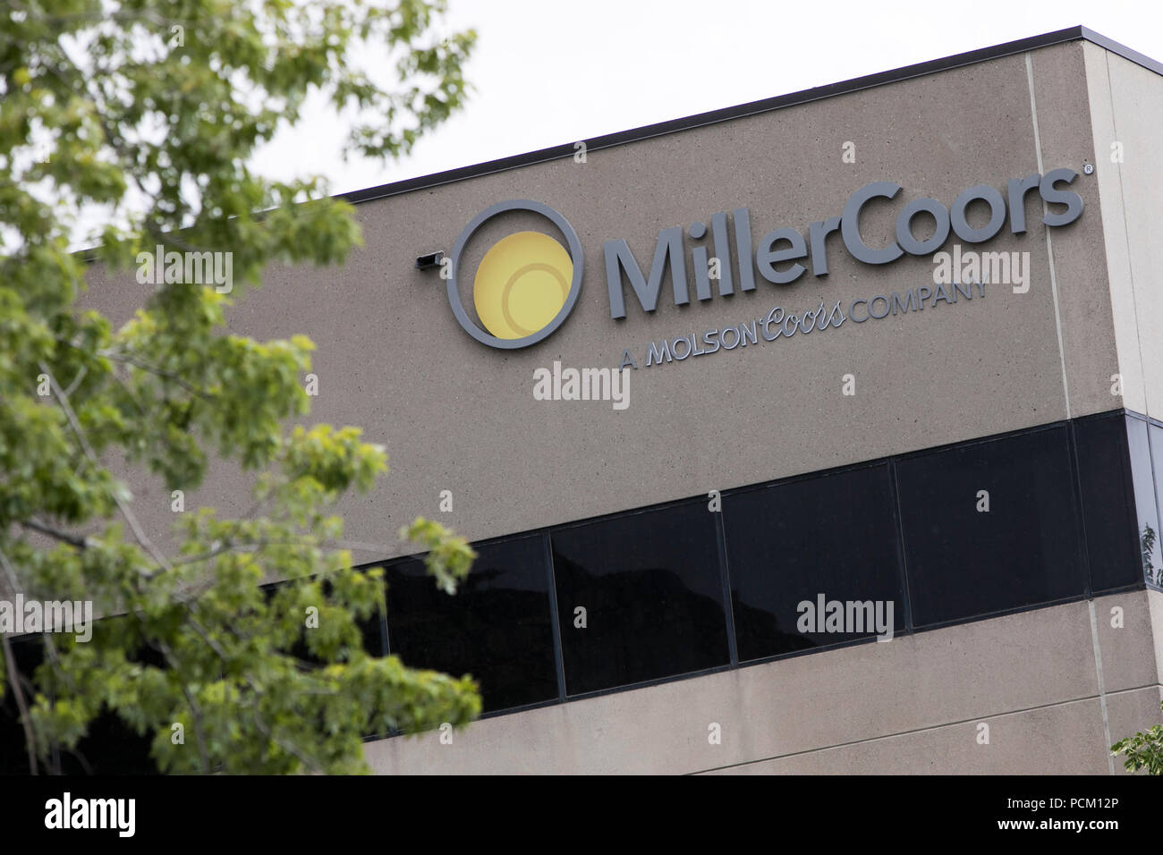 A logo sign outside a facility occupied by MillerCoors in Golden ...