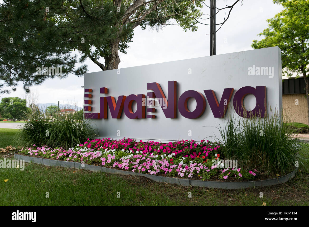 A logo sign outside of a facility occupied by LivaNova in Arvada ...