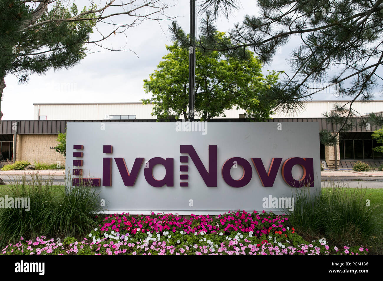 A logo sign outside of a facility occupied by LivaNova in Arvada ...