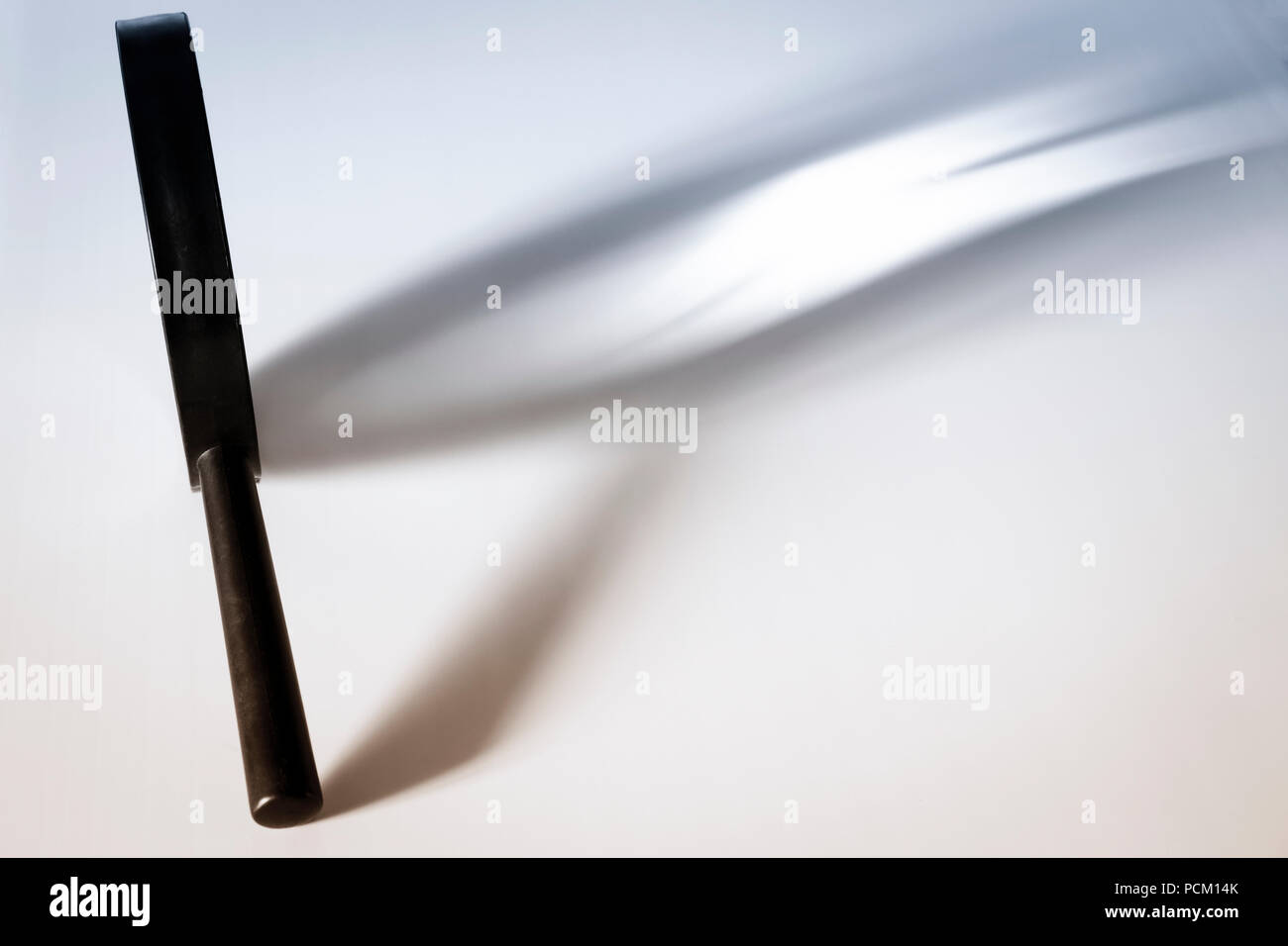 A shadow from a magnifying glass on a white background Stock Photo - Alamy