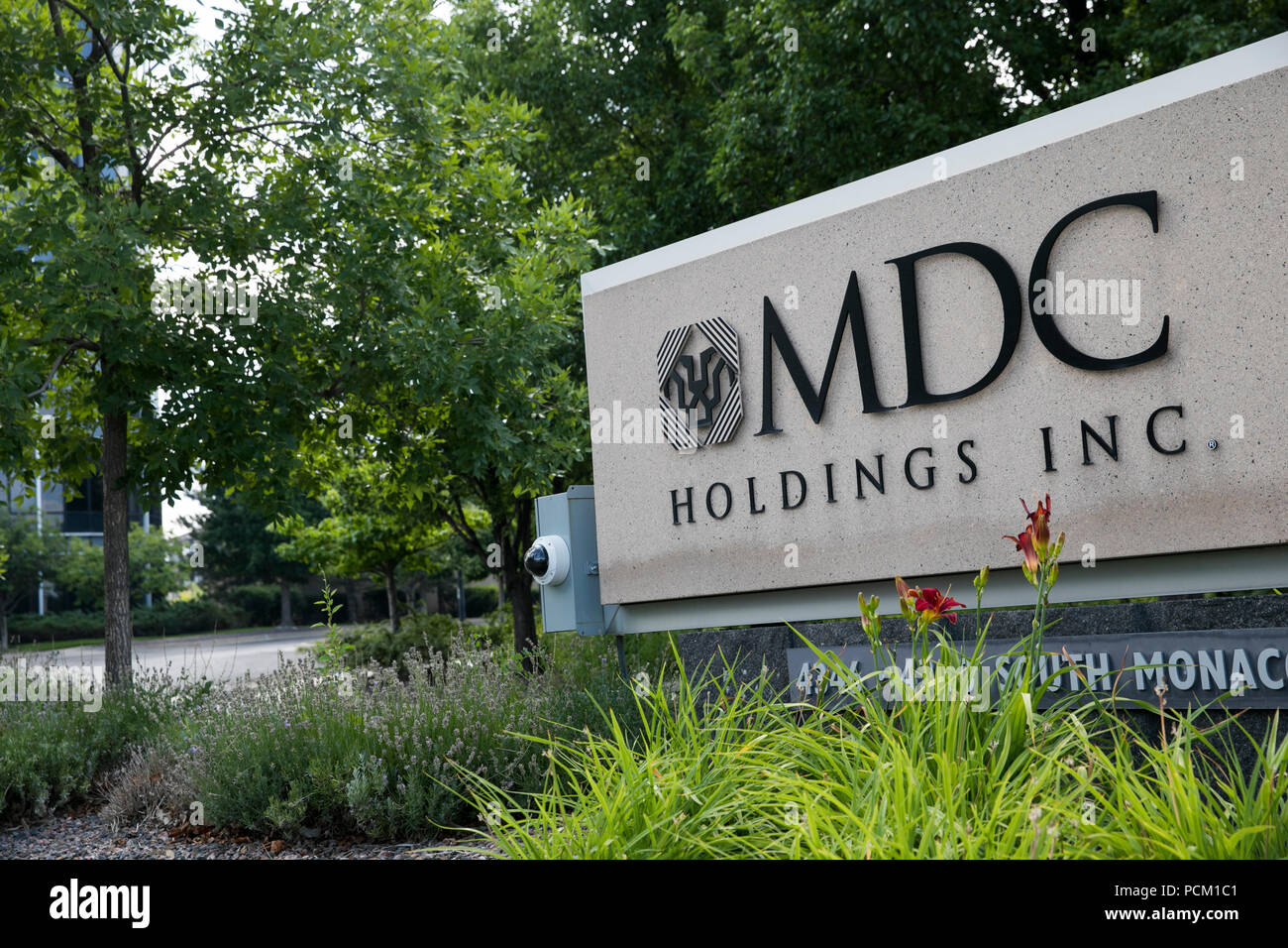 A logo sign outside of the headquarters of MDC Holdings in Denver ...
