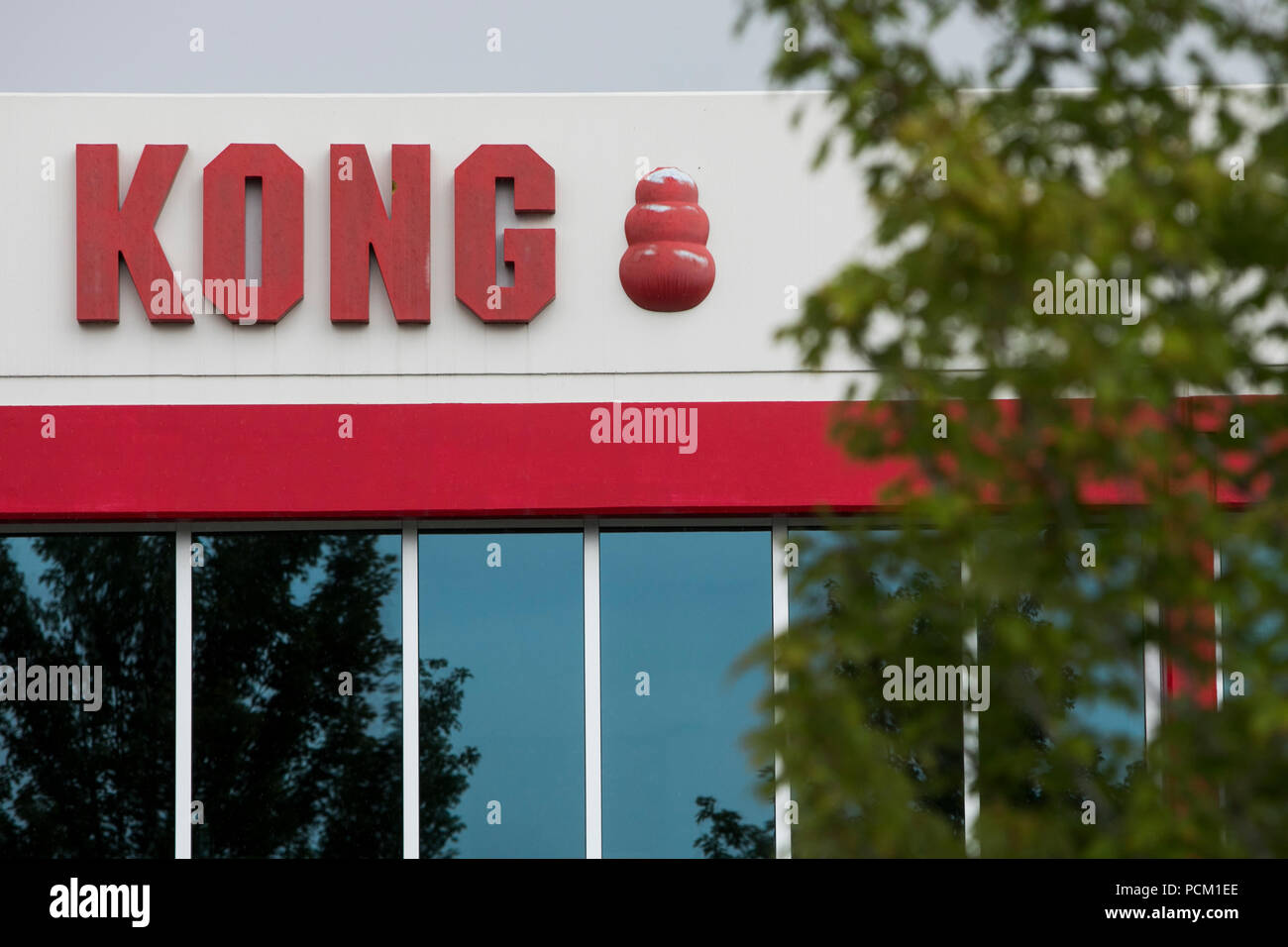 A logo sign outside of the headquarters of The Kong Company in Golden ...