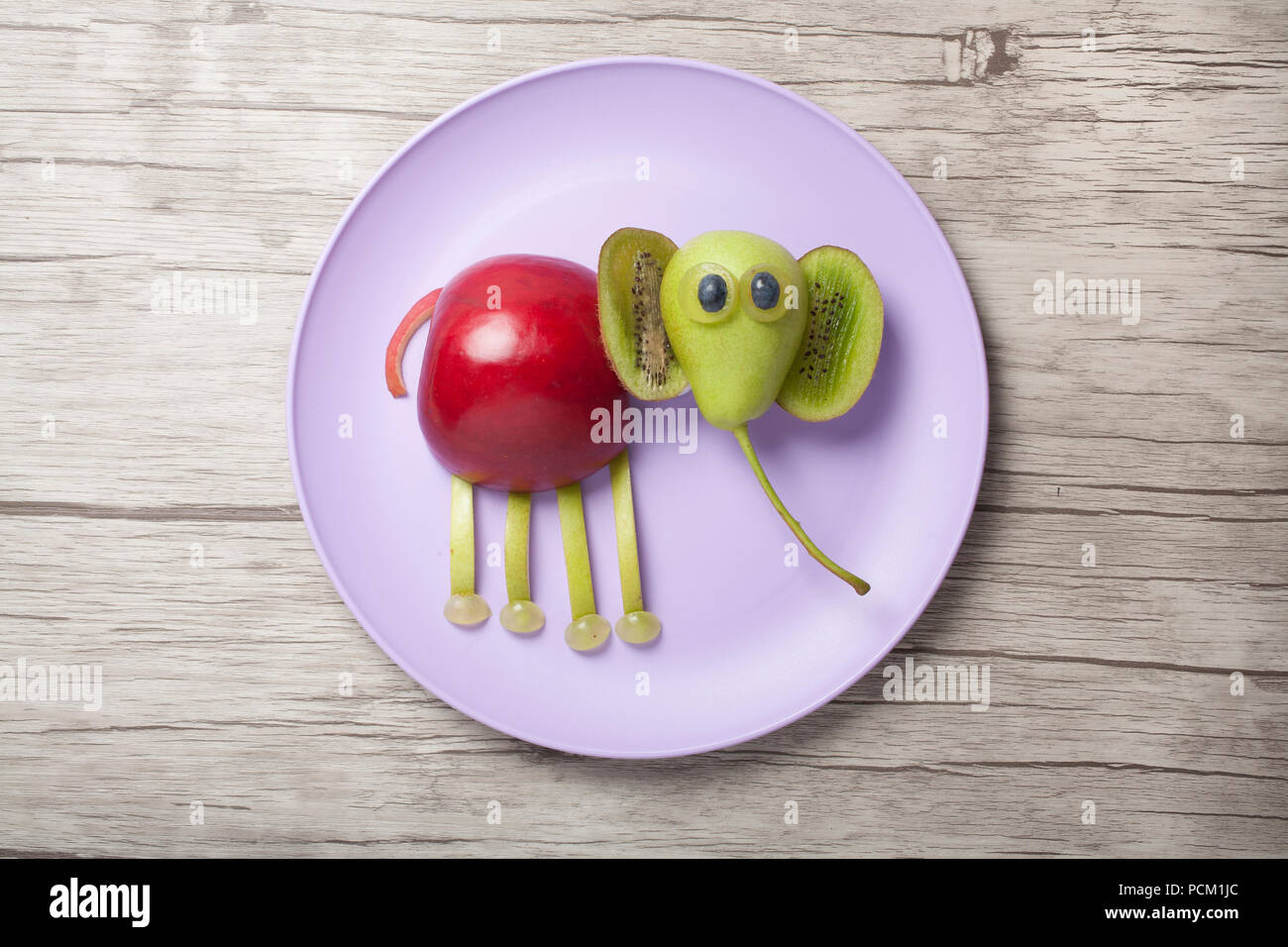 Creative fruit idea hi-res stock photography and images - Alamy