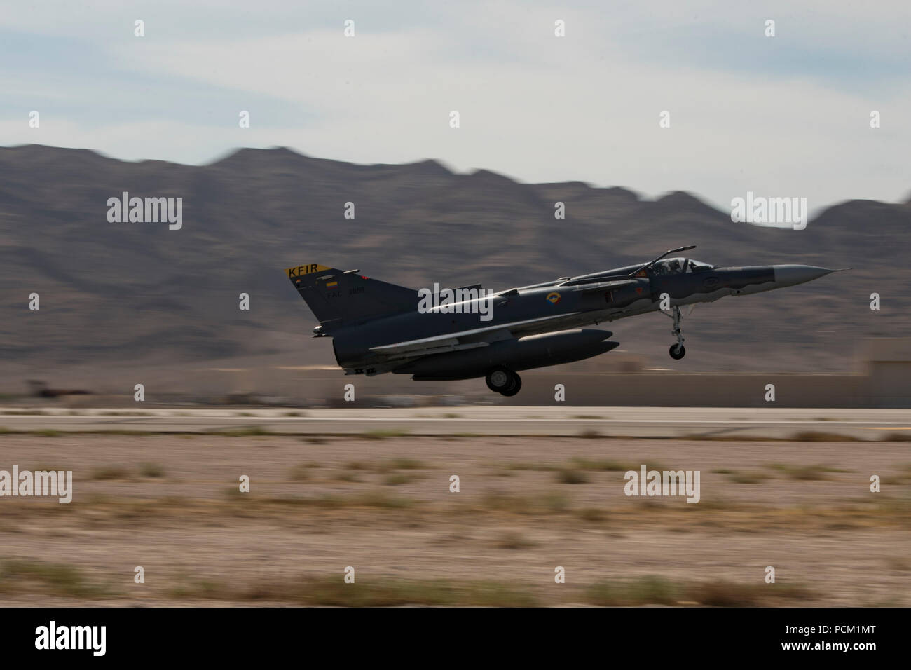 A Colombian Air Force Kfir fighter jet lands at Nellis Air Force Base ...