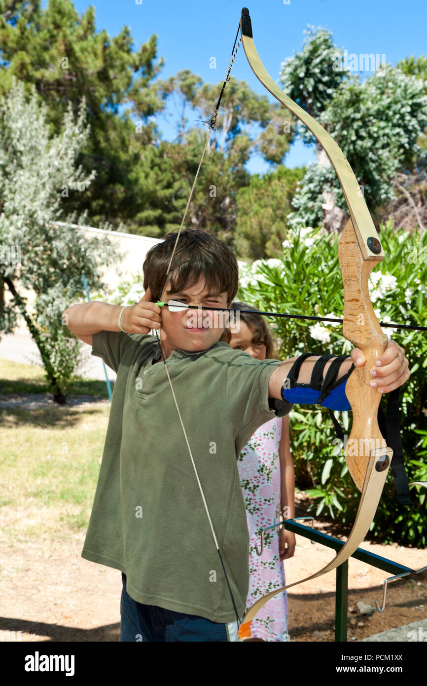 portrait of a child, archery, outdoor Stock Photo - Alamy