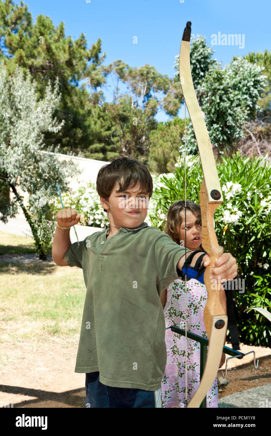 portrait of a child, archery, outdoor Stock Photo - Alamy