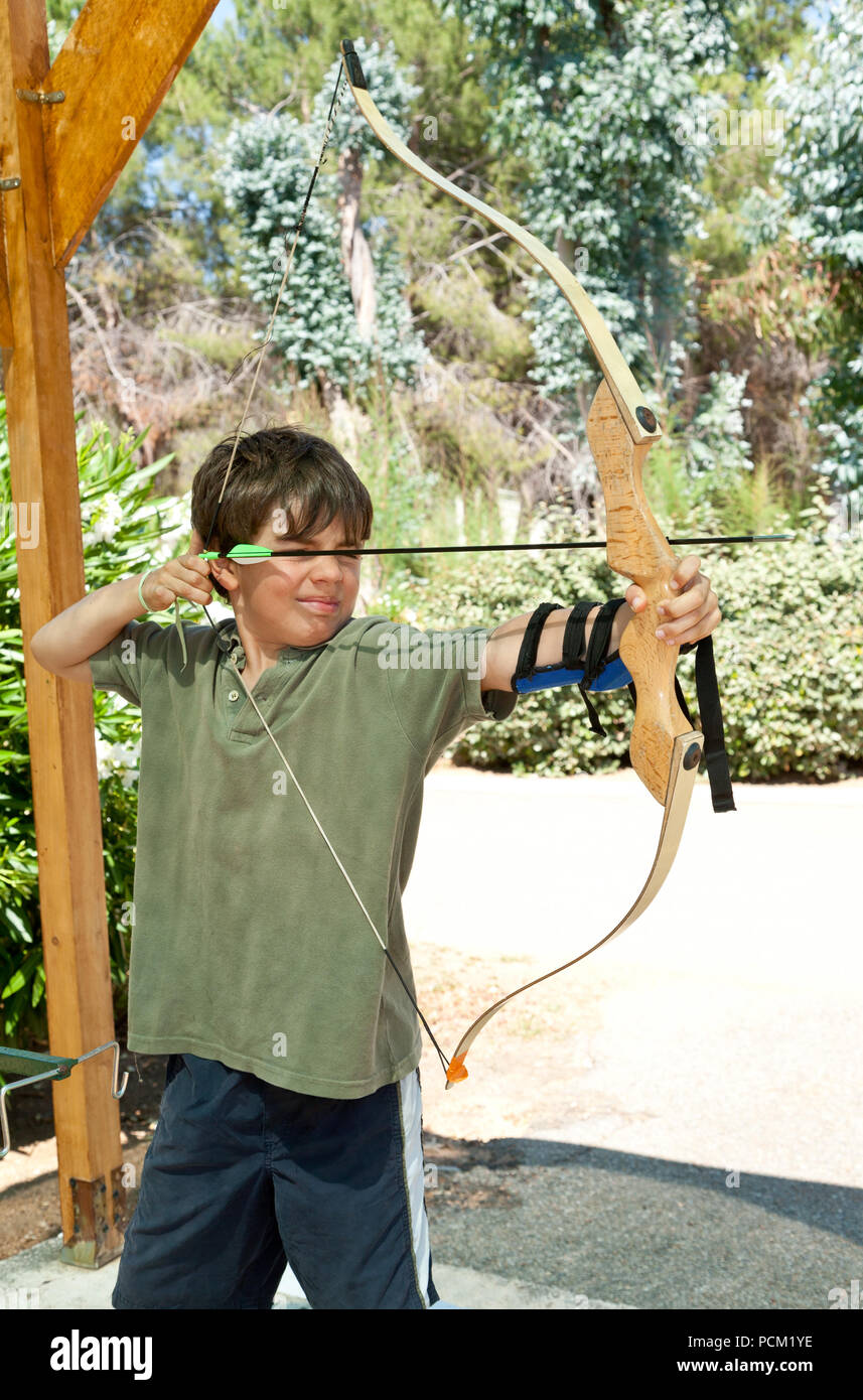 portrait of a child, archery, outdoor Stock Photo - Alamy