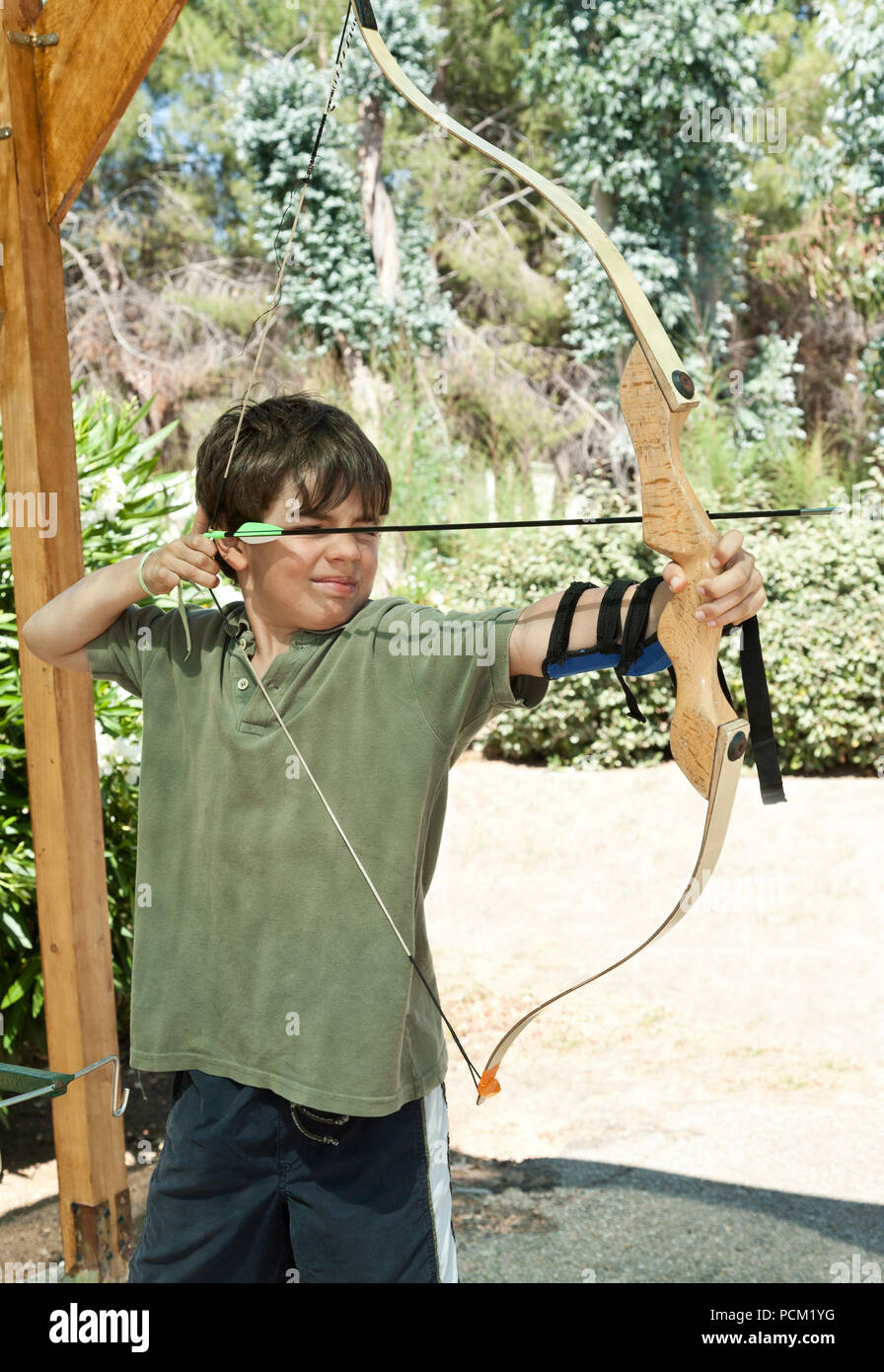 portrait of a child, archery, outdoor Stock Photo - Alamy