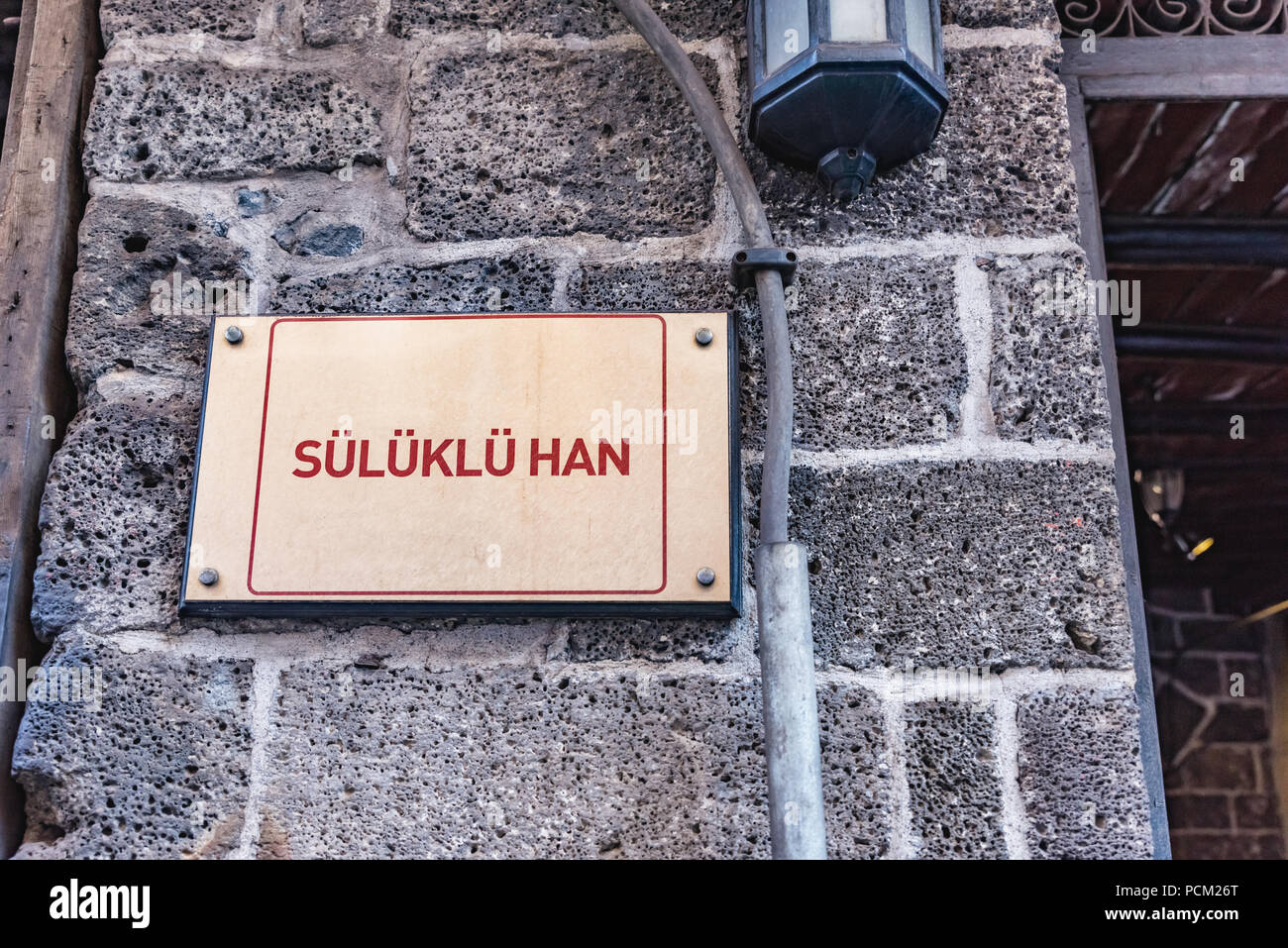 Signboard of Suluklu Khan,a medieval inn used for cafes and small shops ...