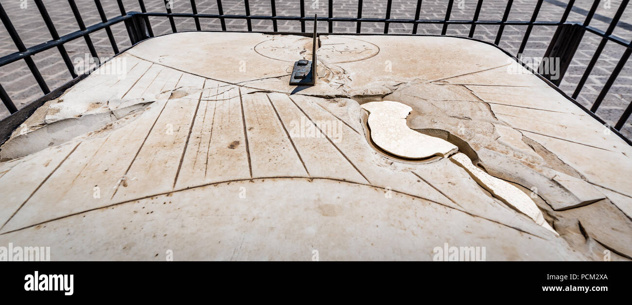 View of old ancient stone sundial in courtyard of Ulu (Grand) Mosque in ...