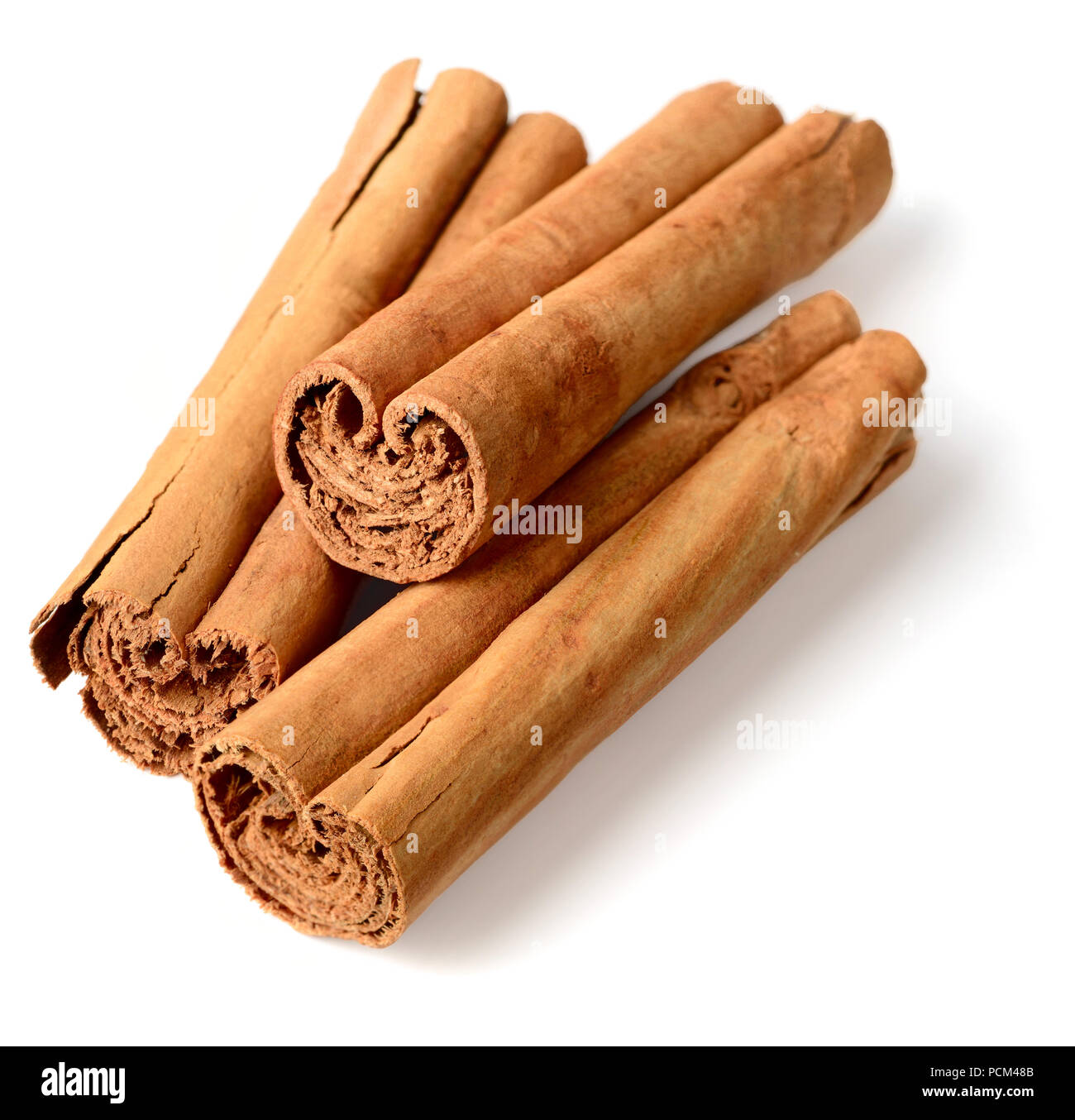 close up of cinnamon sticks isolated on white background Stock Photo ...