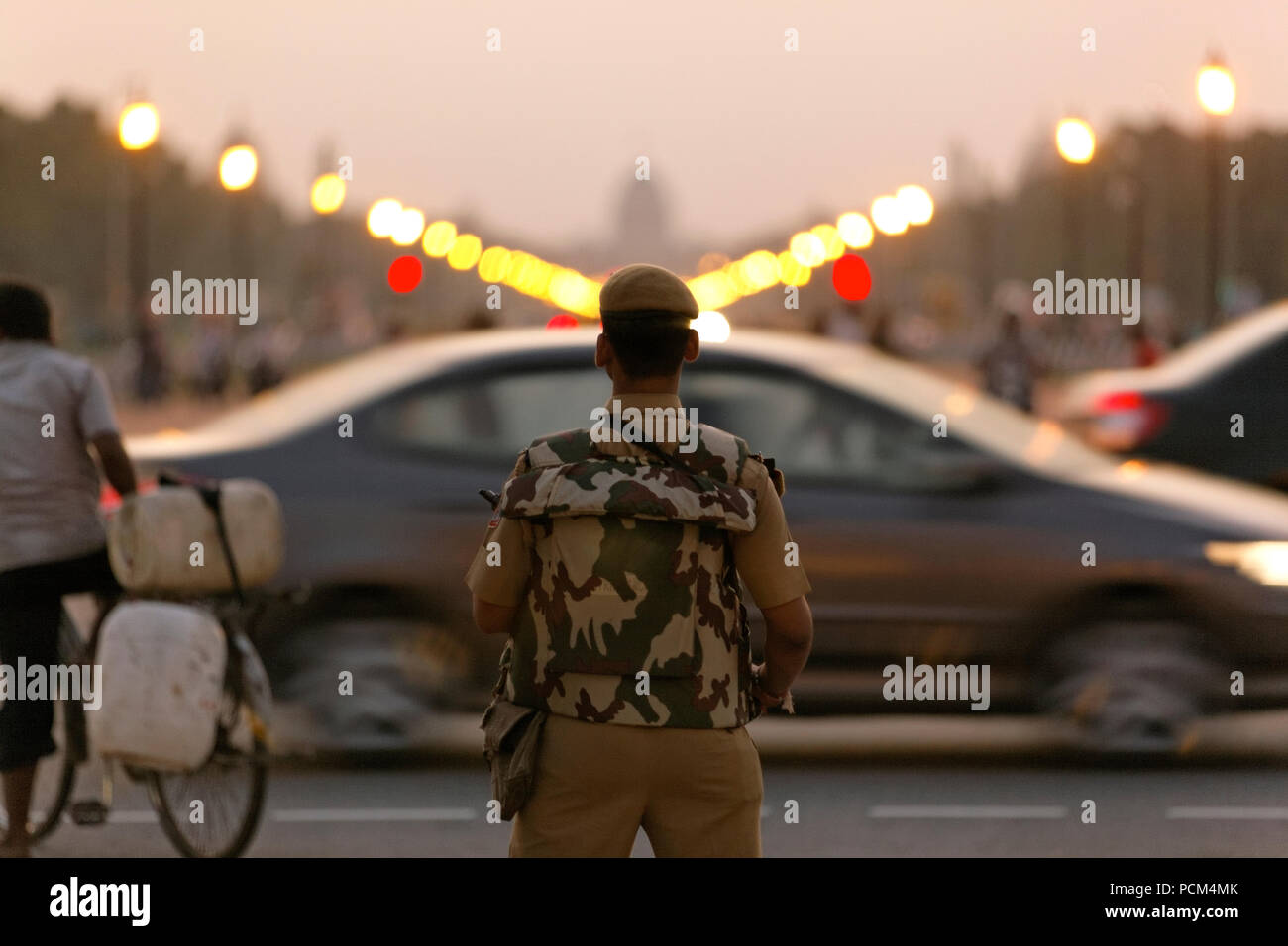 Security guard at India Gate in New Delhi guarding the historic ...