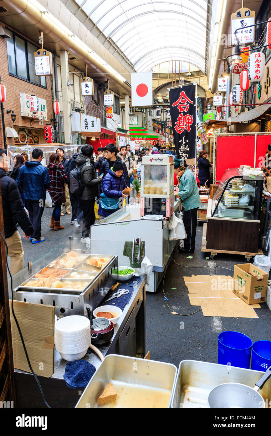 Kuromon Ichiba, Osaka's kitchen food market. View along arcade with ...