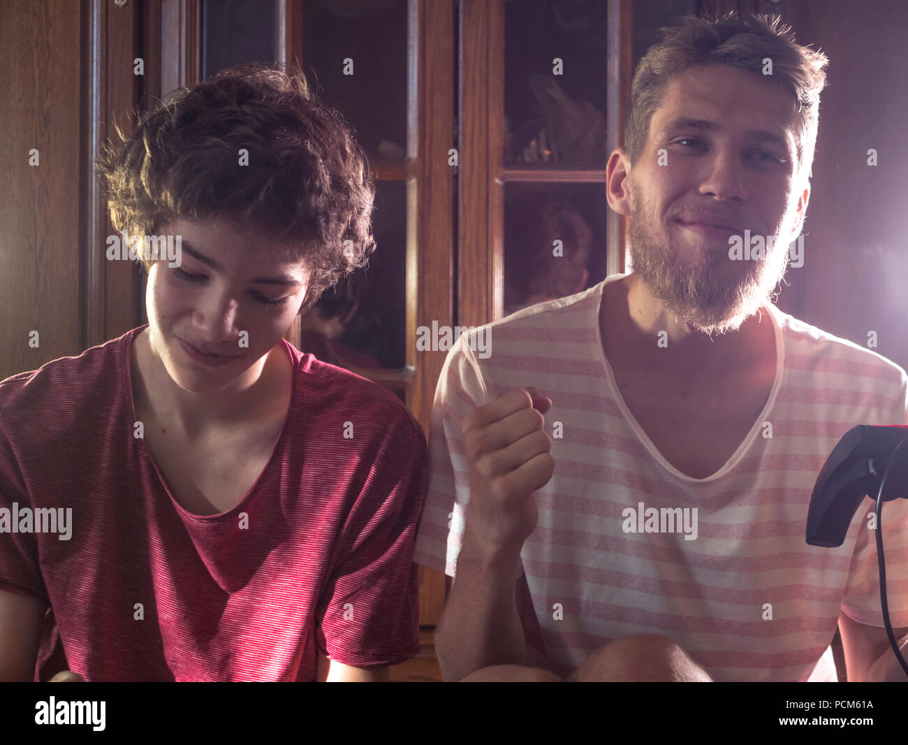 Two guys playing video games hi-res stock photography and images - Alamy