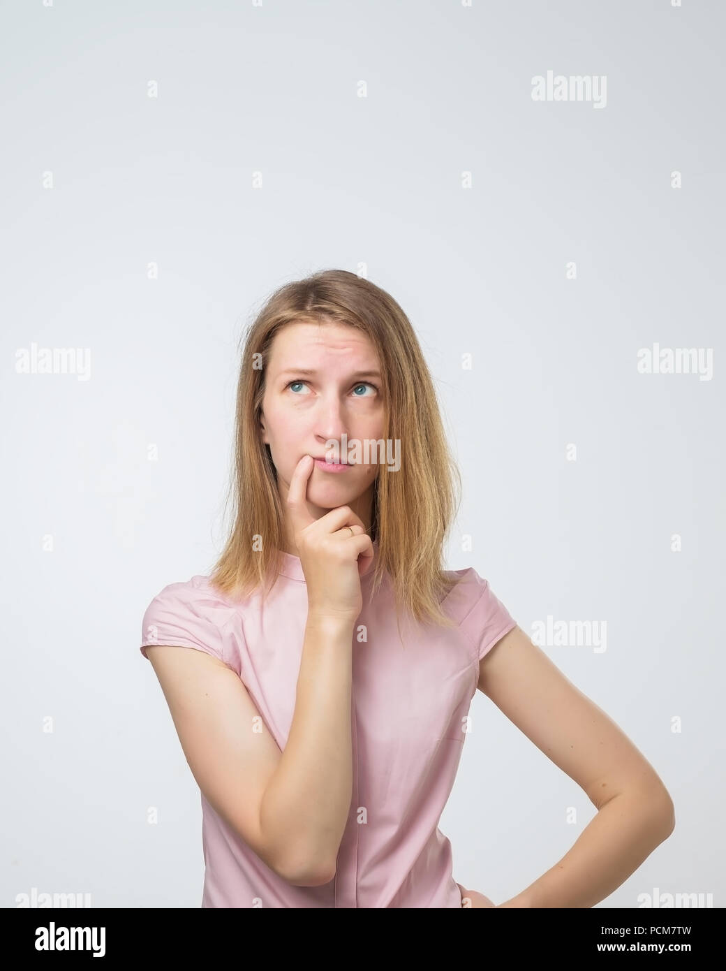 Feeling pensive hi-res stock photography and images - Alamy
