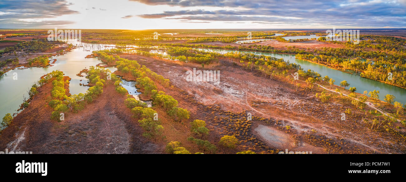 Wide aerial panorama of iconic Murray River flowing among native trees ...