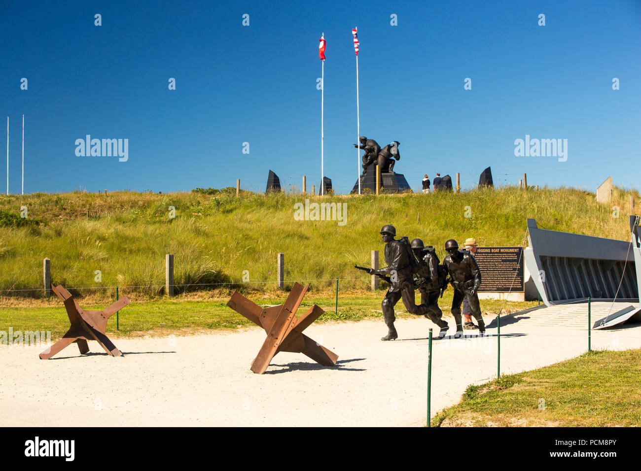 A memerial and sculptures of landing crafts and soldiers at the Utah ...