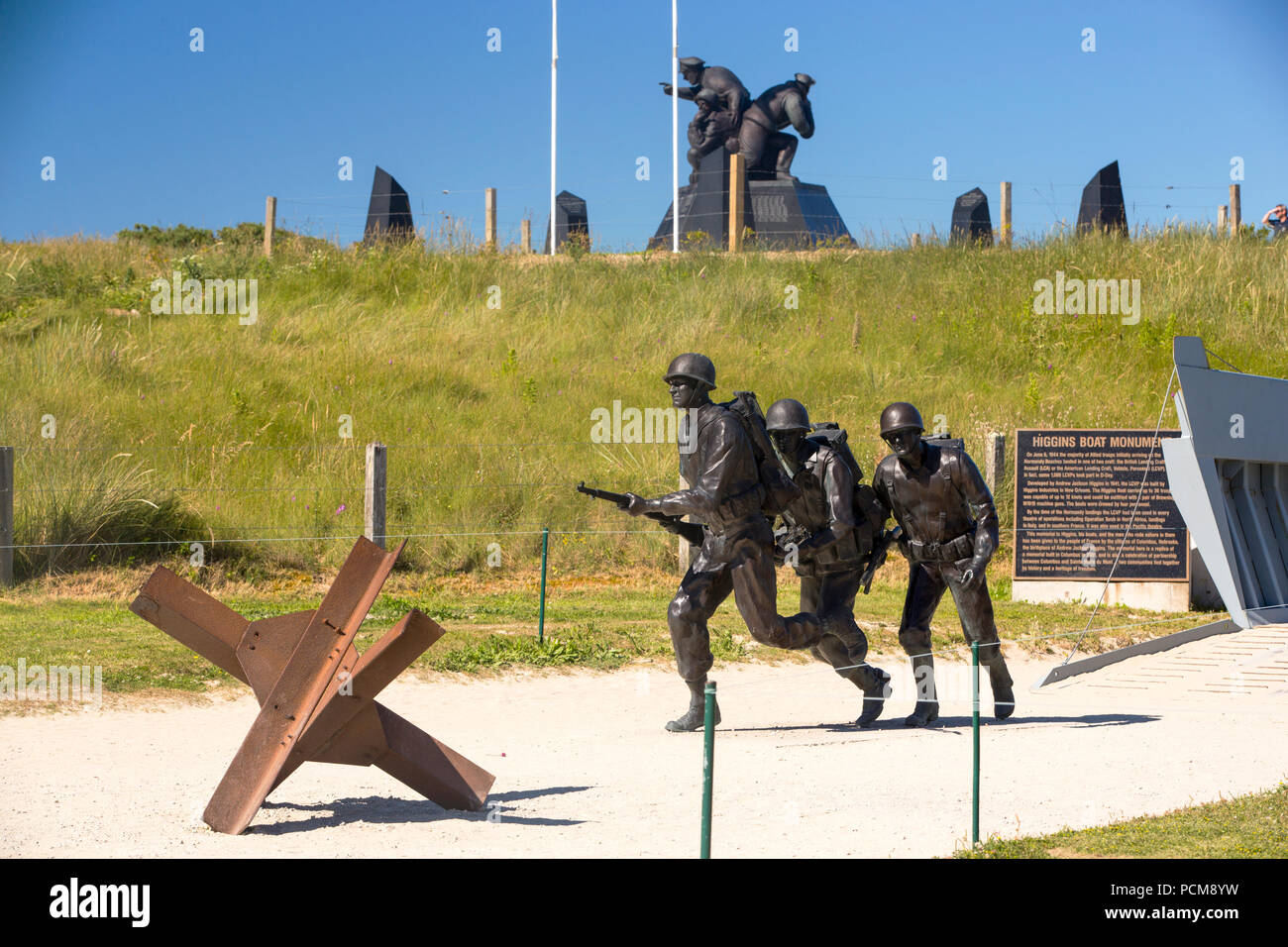 A memerial and sculptures of landing crafts and soldiers at the Utah ...