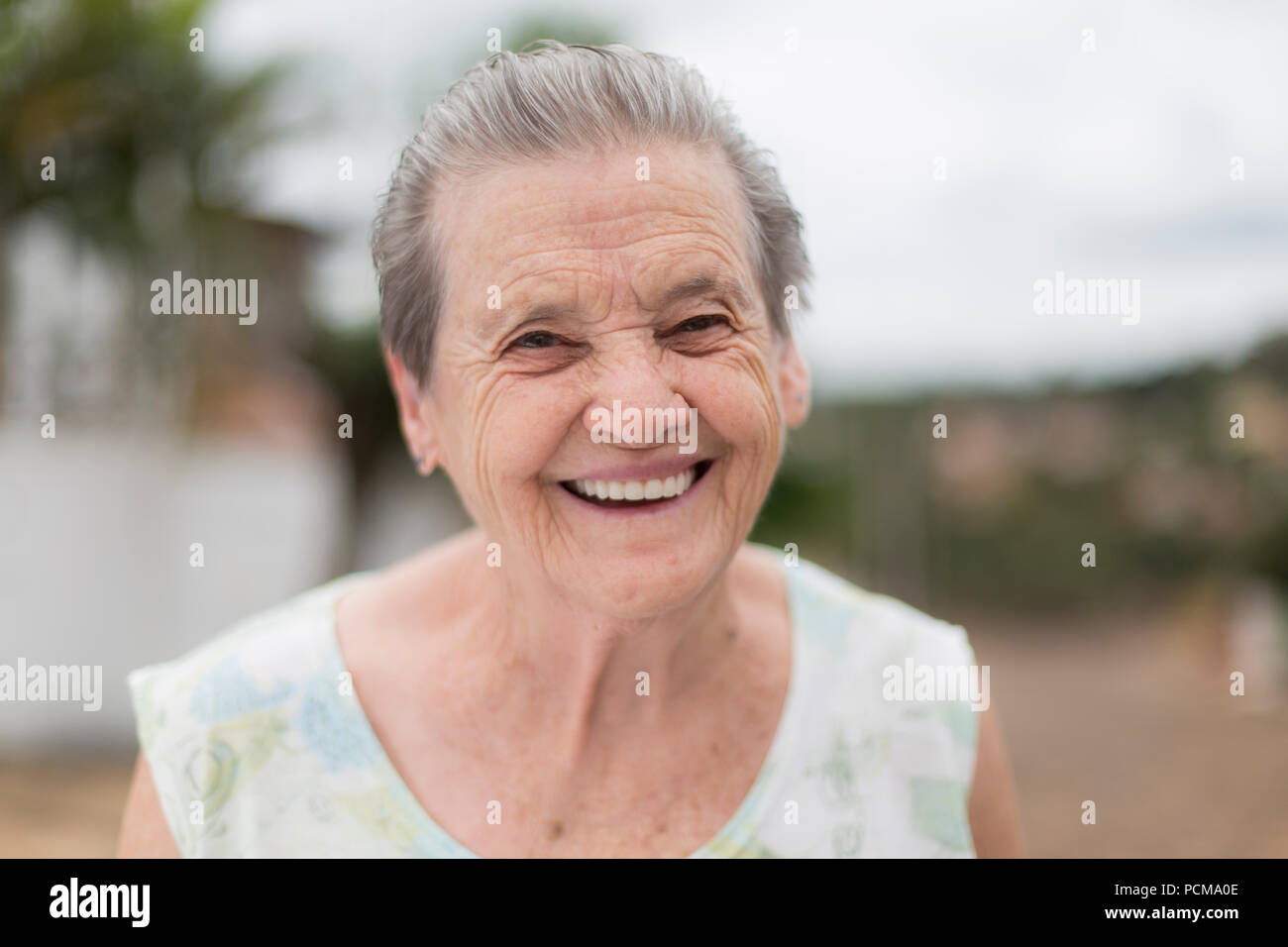 Portrait of a happy grandma - Portrait of a smiling elderly woman Stock ...