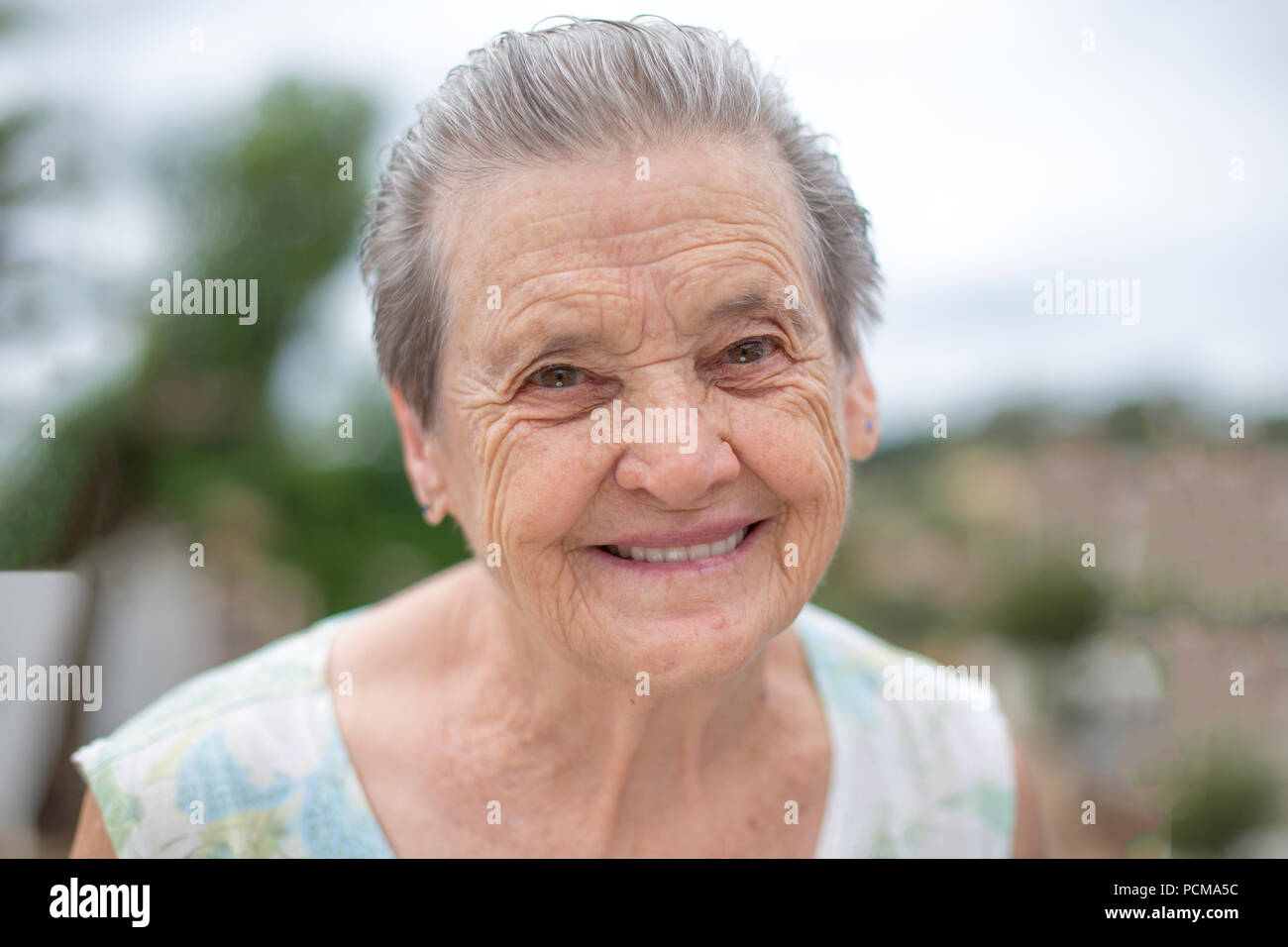 Portrait of a happy grandma - Portrait of a smiling elderly woman Stock ...