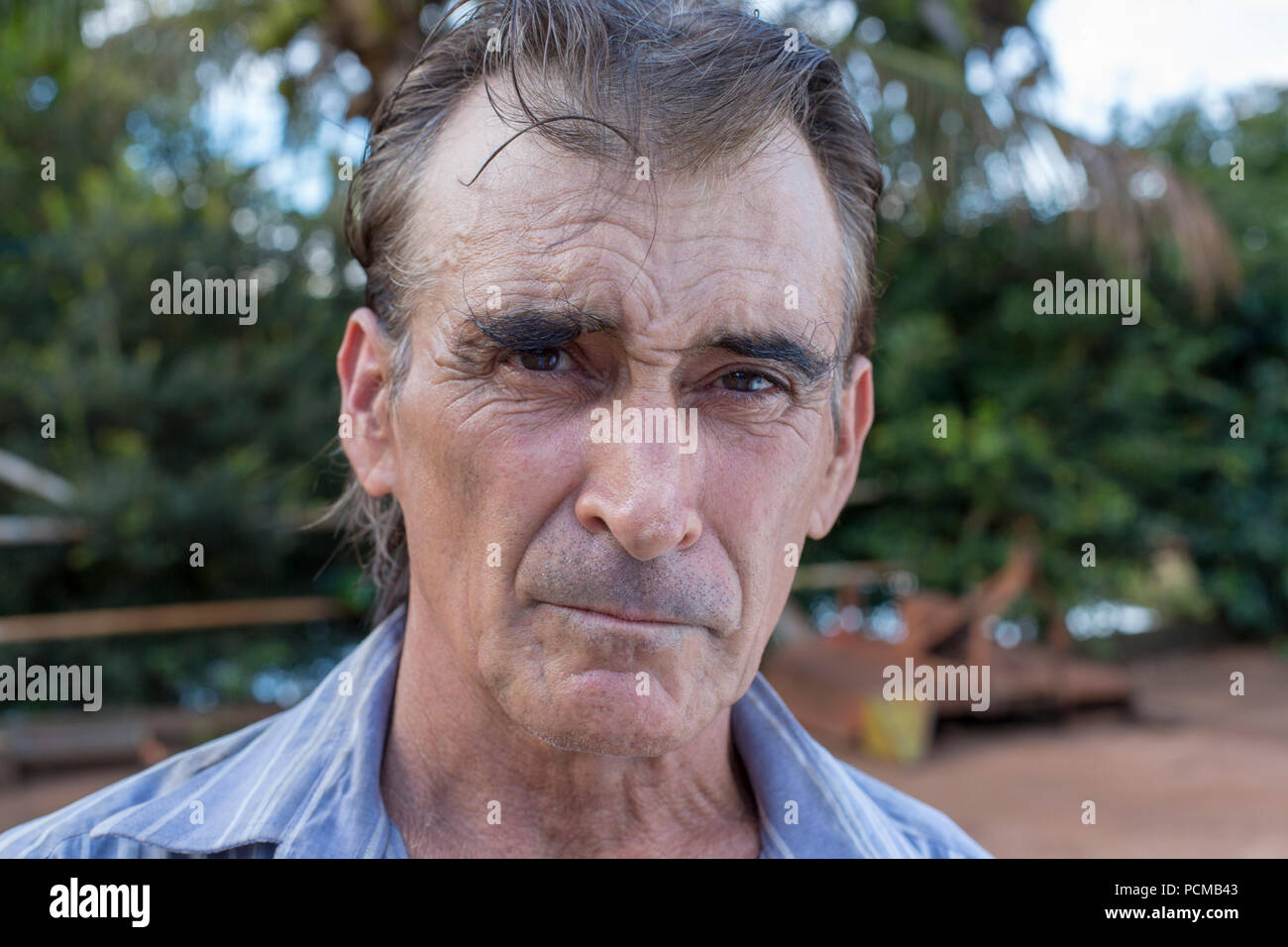 Middle aged man portrait on farmland Stock Photo - Alamy