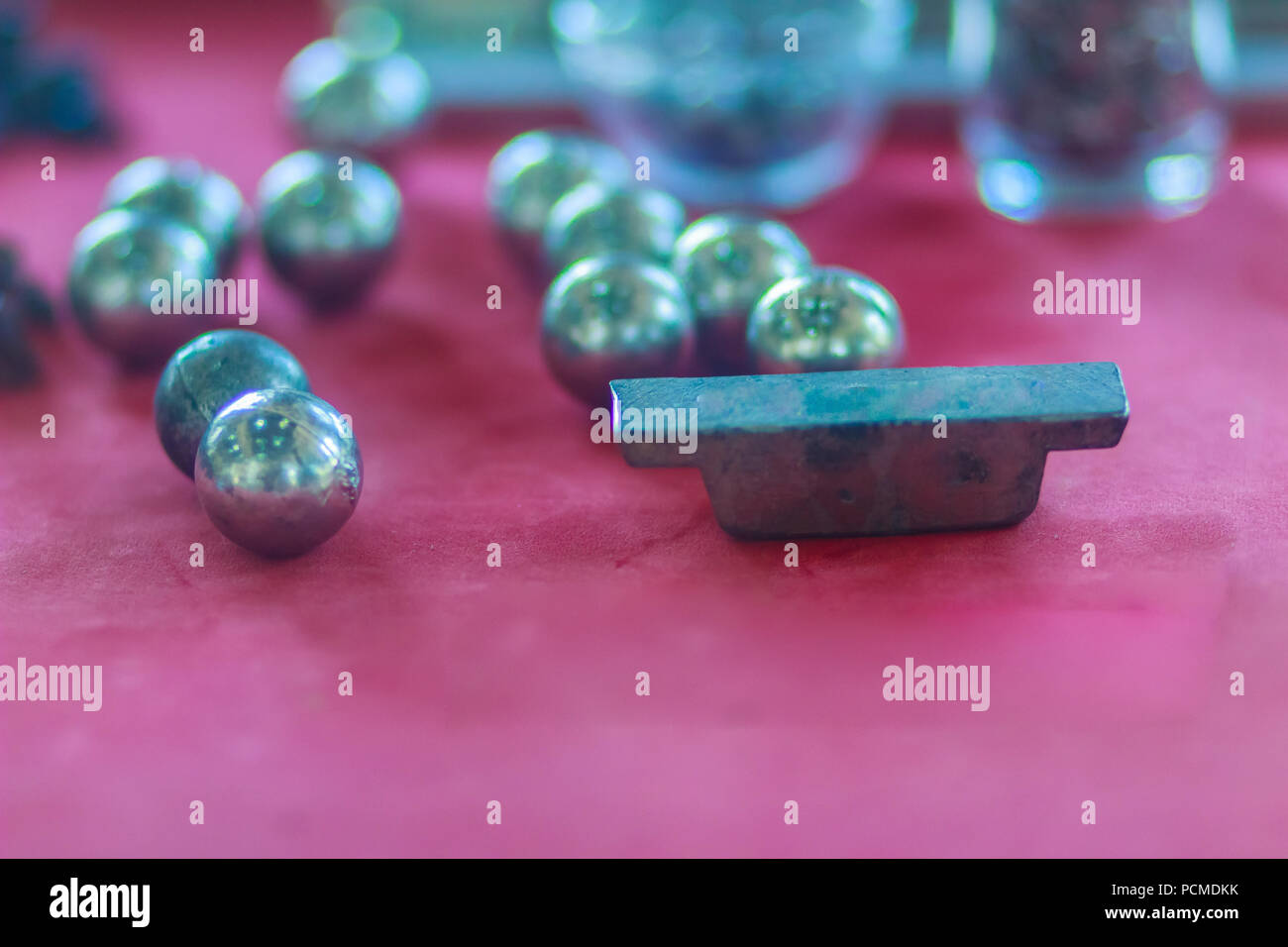 Granulated pure tin after melting in tin mining process Stock Photo - Alamy